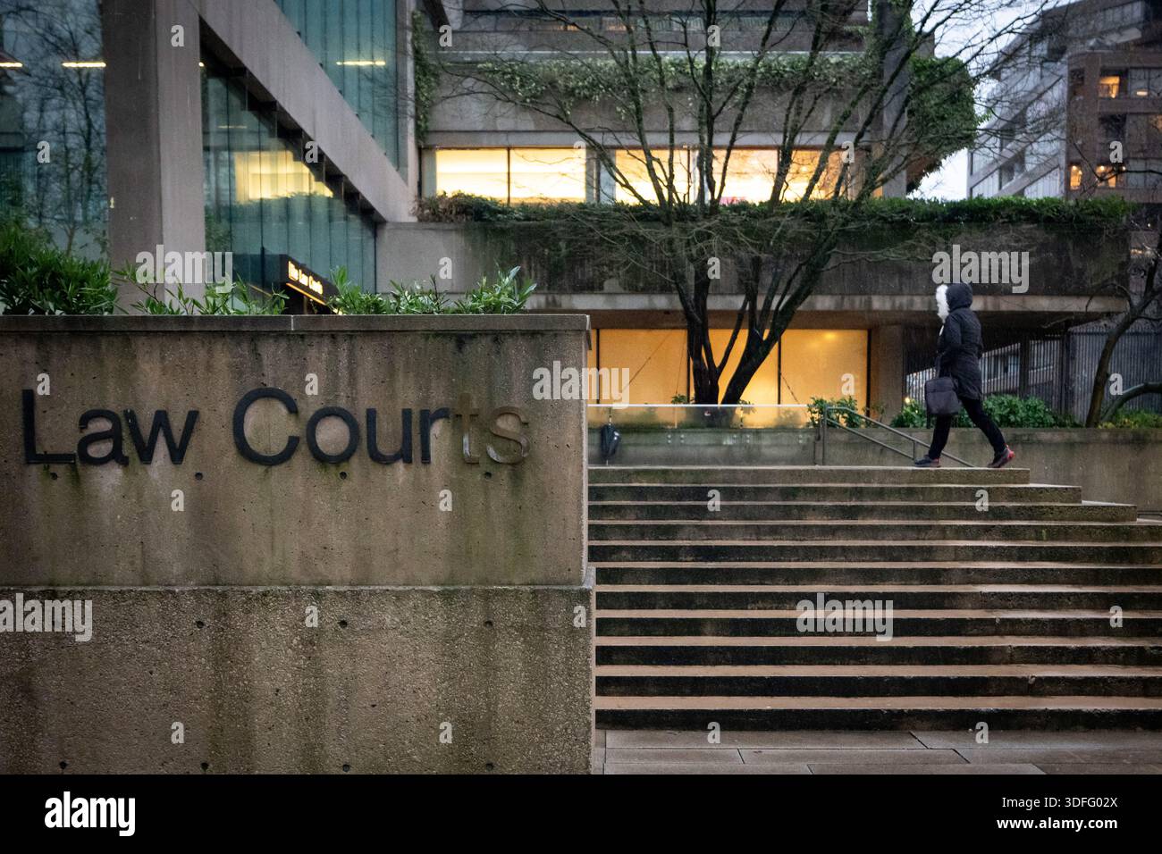 A person walks up the stairs of the Law Courts building, which is home ...