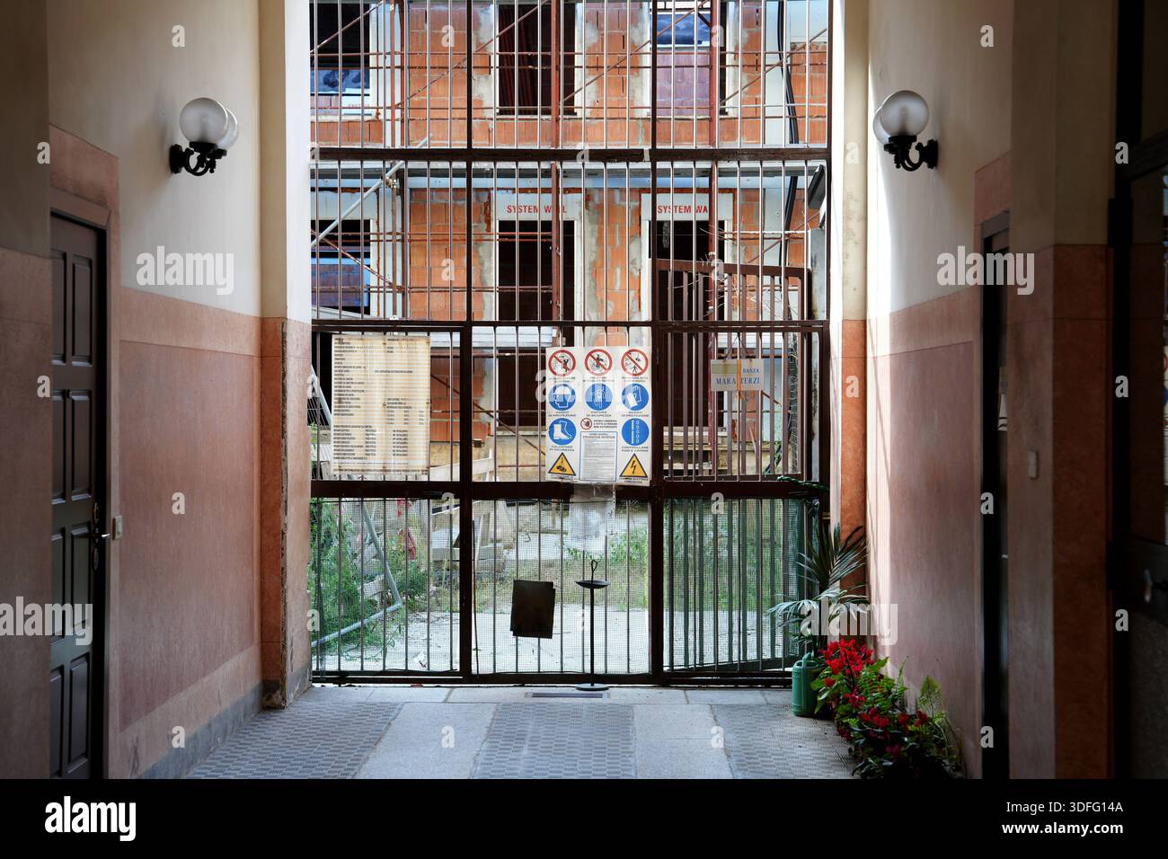 Milan, a building under construction in the courtyard is blocked by the ...