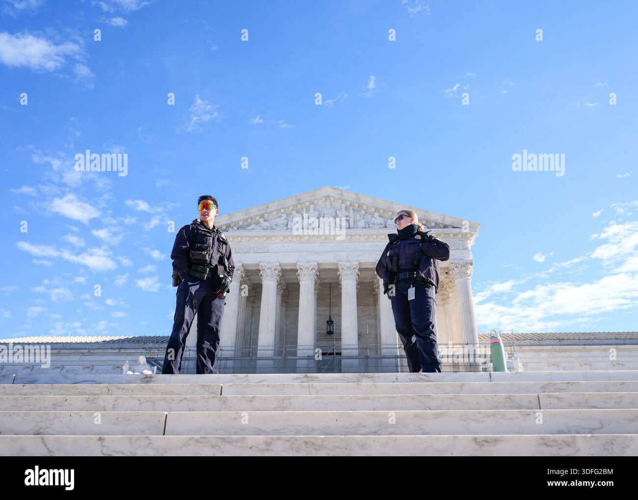 U.S. Supreme Court police officers stand outside the Supreme Court ...