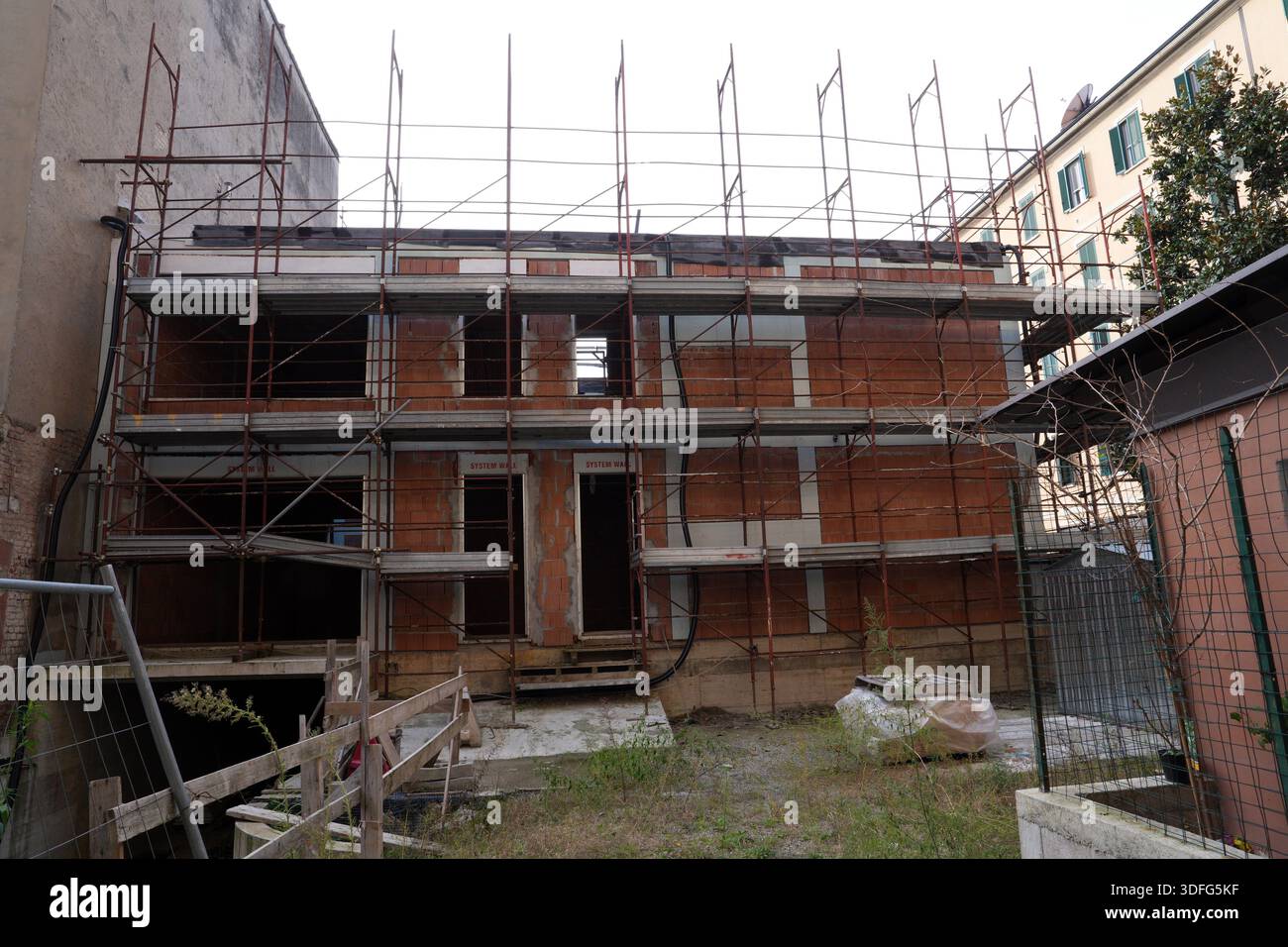 Milan, a building under construction in the courtyard is blocked by the ...