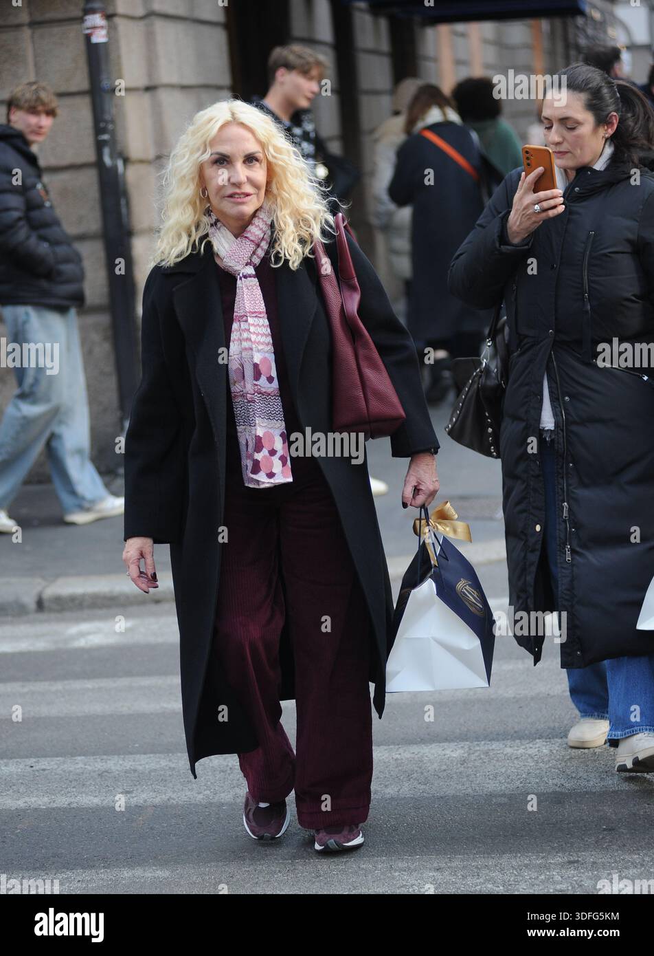 Milan Antonella Clerici arrives downtown with two friends, and after ...