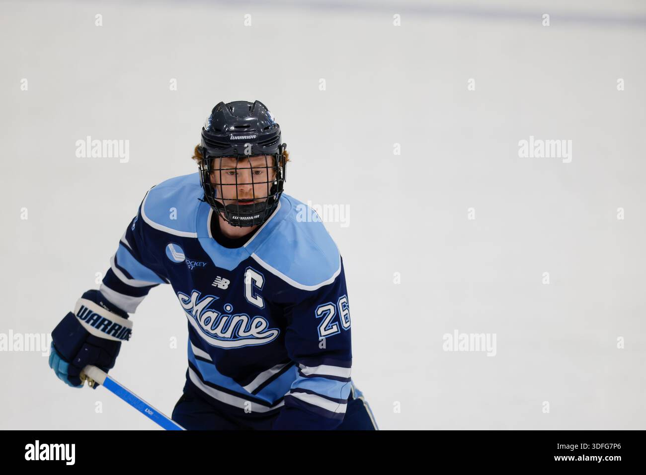 Maine forward Thomas Freel (26) skates during the first period of an ...