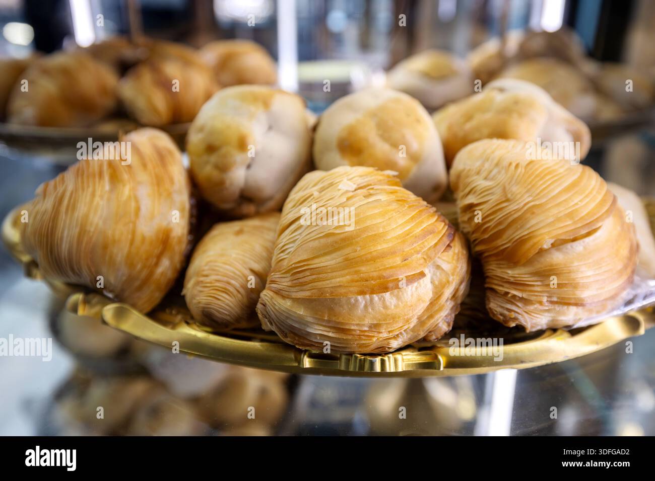 Traditional Italian sfogliatelle ricce pastries in a Neapolitan bakery ...