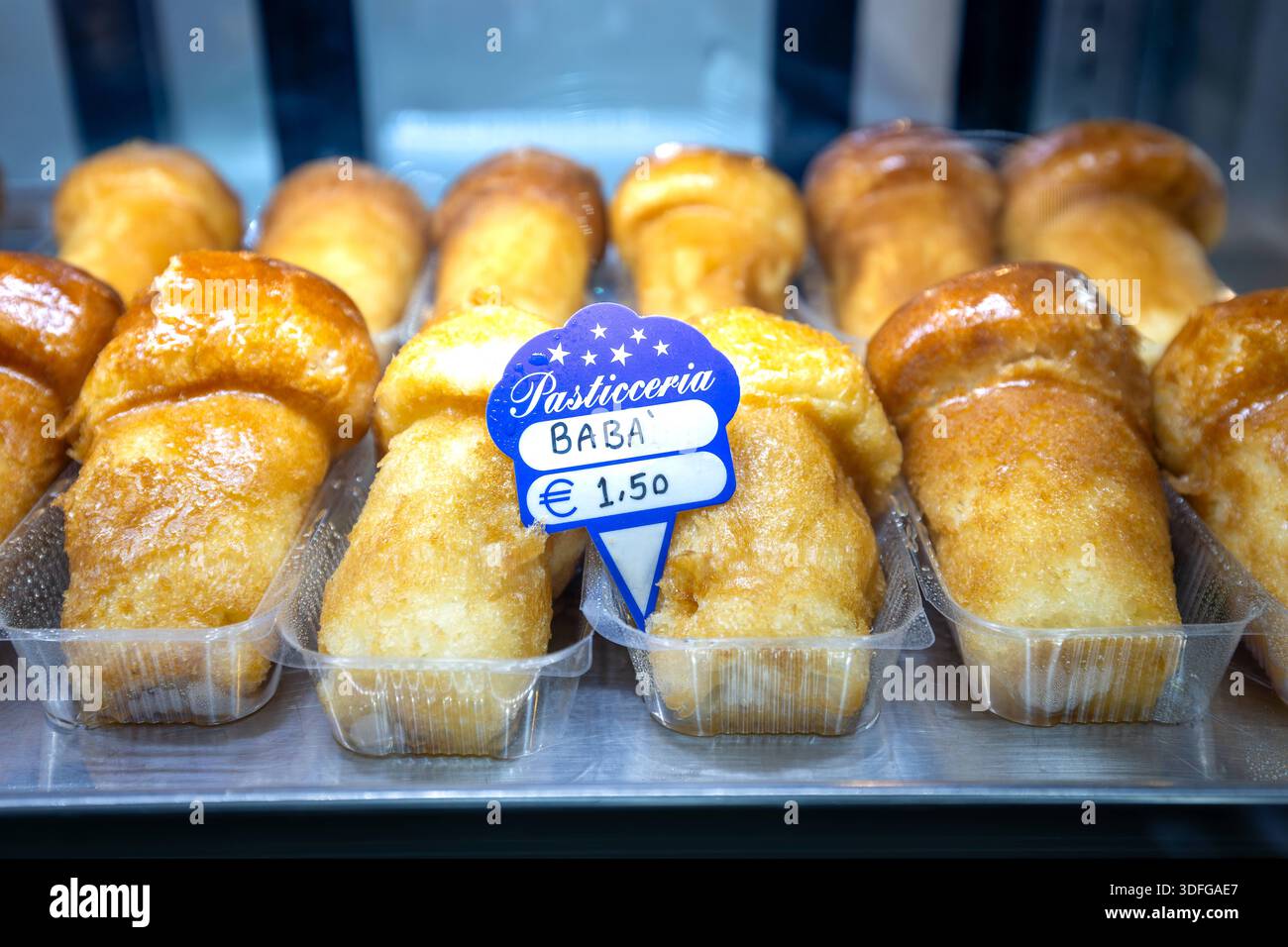 Rum babÃ pastries with price tag in an Italian pastry shop window ...