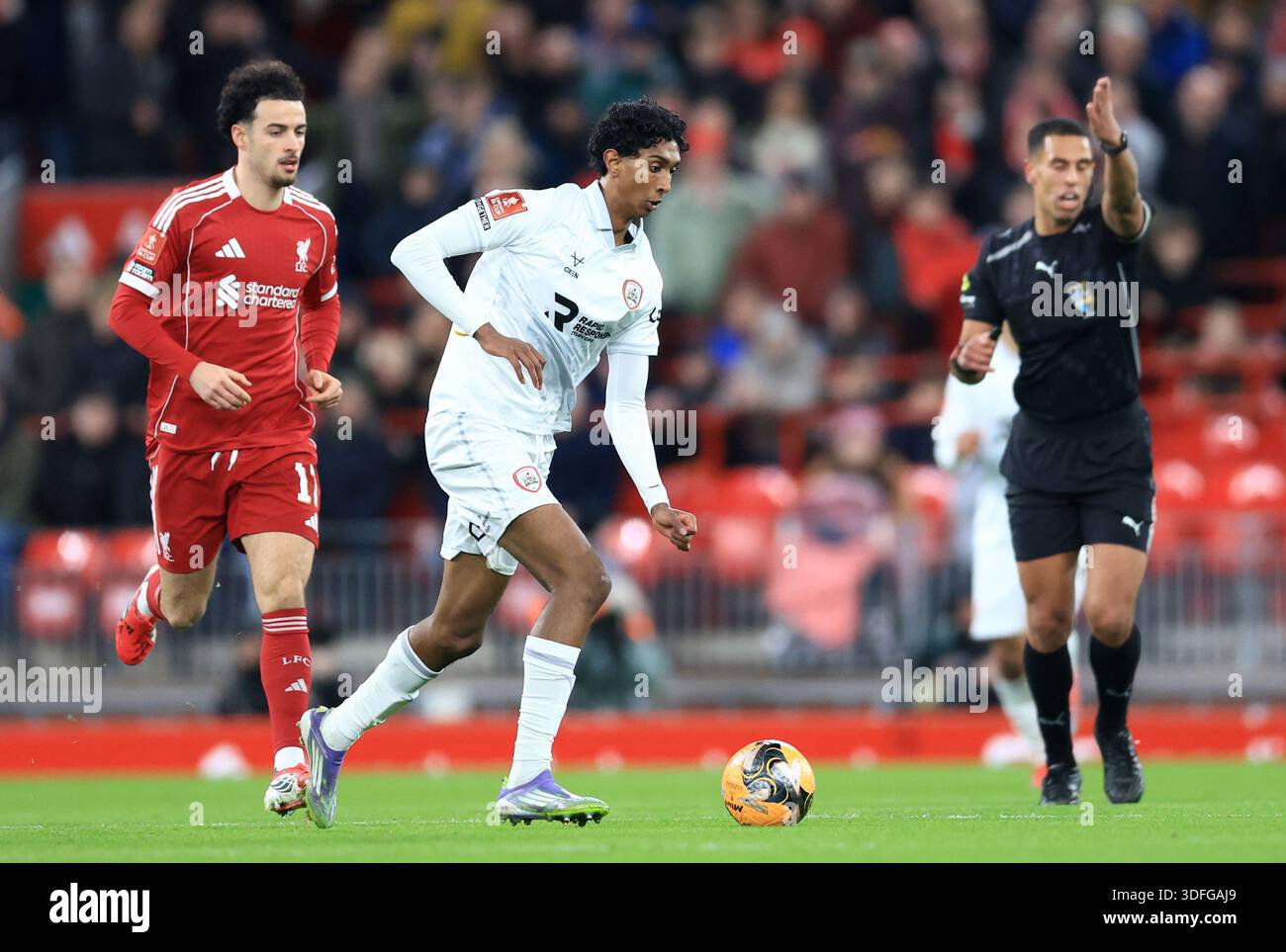 Liverpool, UK. 12th Jan, 2026. Vimal Yoganathan of Barnsley with the ...