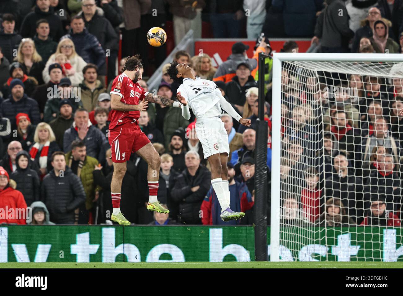 Vimal Yoganathan of Barnsley heads the ball clear of the goal during ...