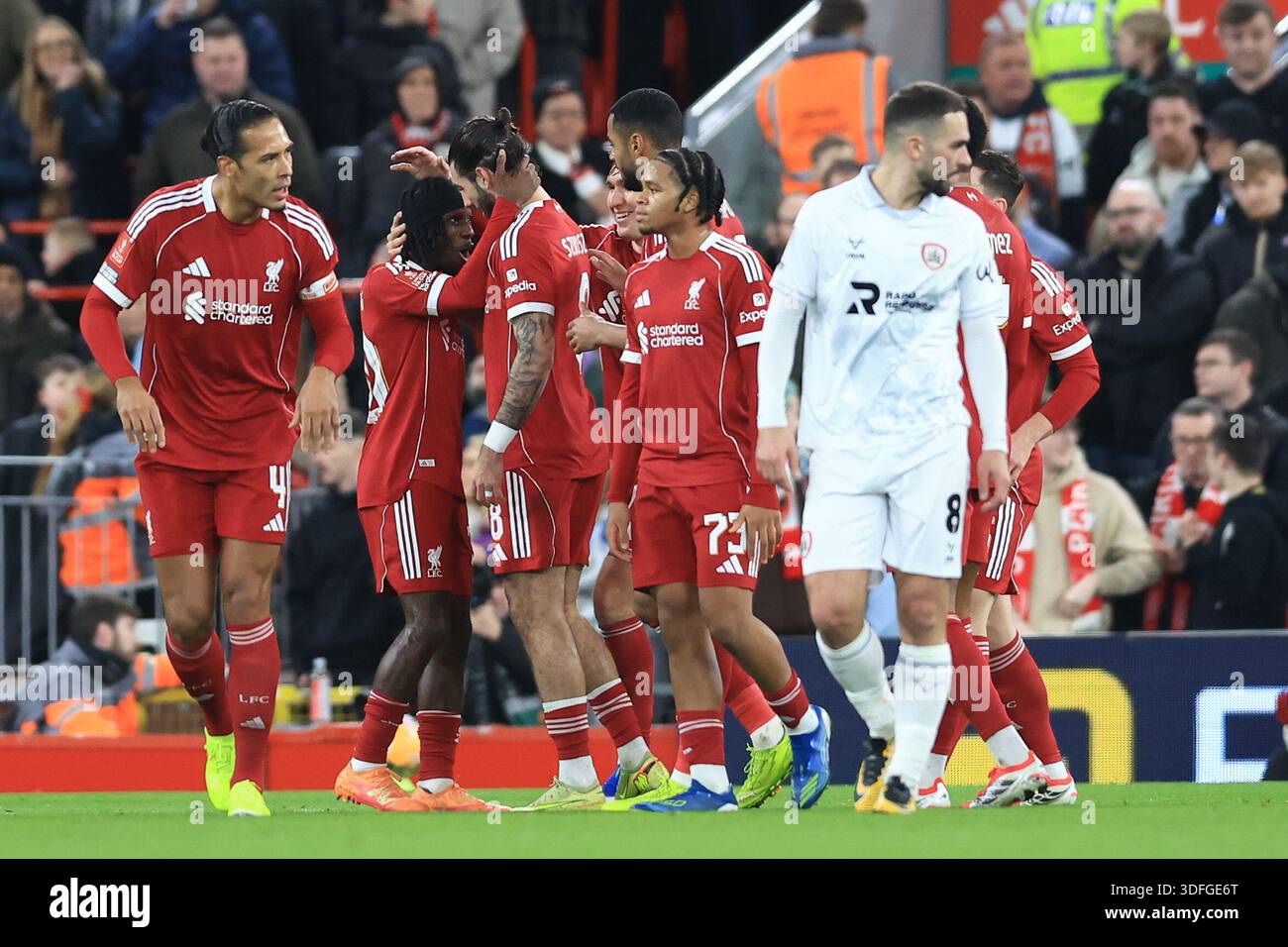 Liverpool, England, 12th January 2026. Jeremie Frimpong ( 2nd L) of ...