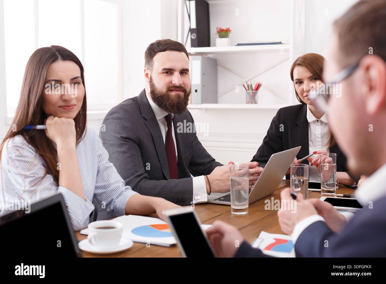 Business corporate meeting. Boss with employees listening to report ...