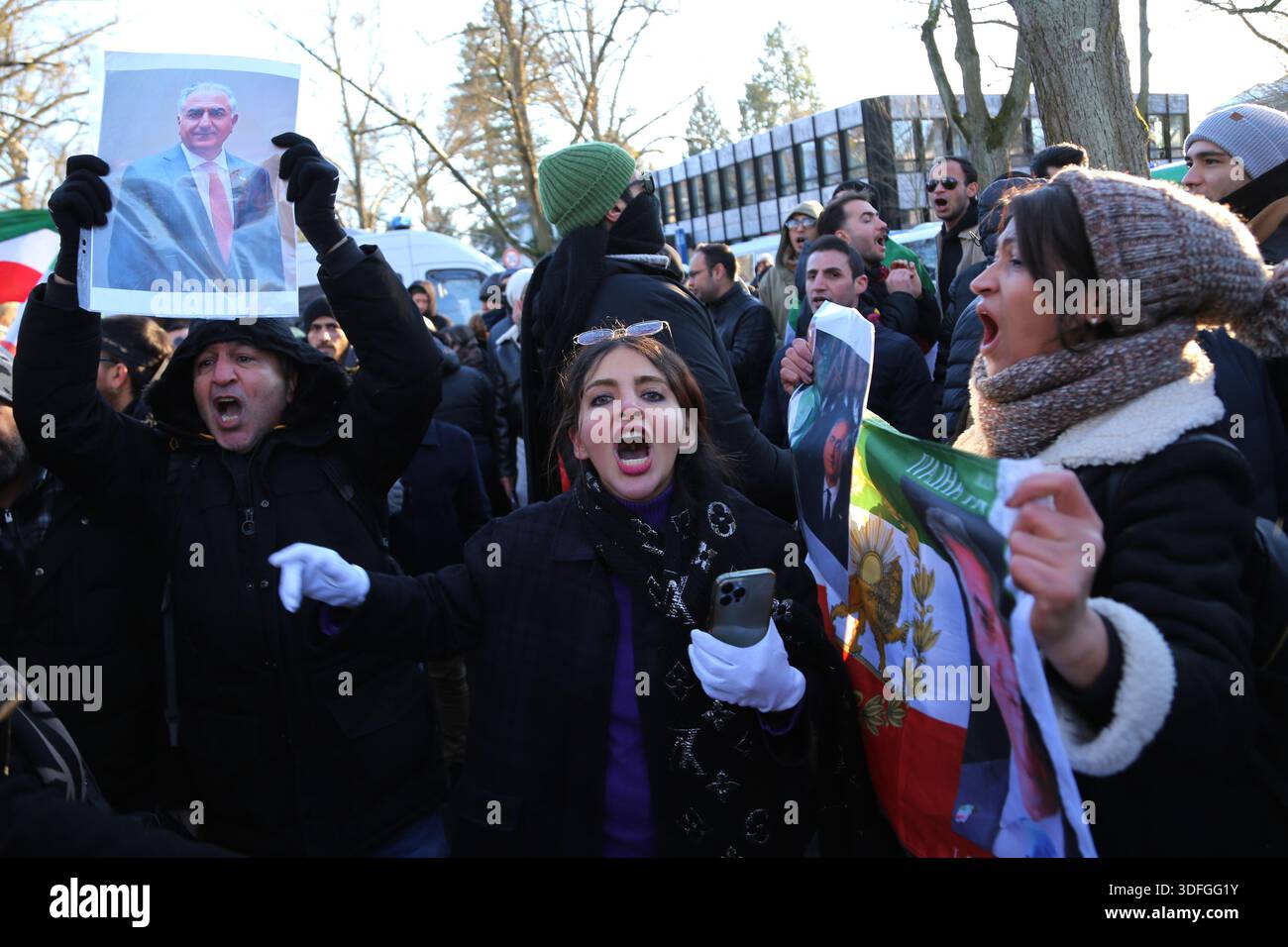 Berlin, Germany. 11th Jan, 2026. Protesters chant slogans during a ...