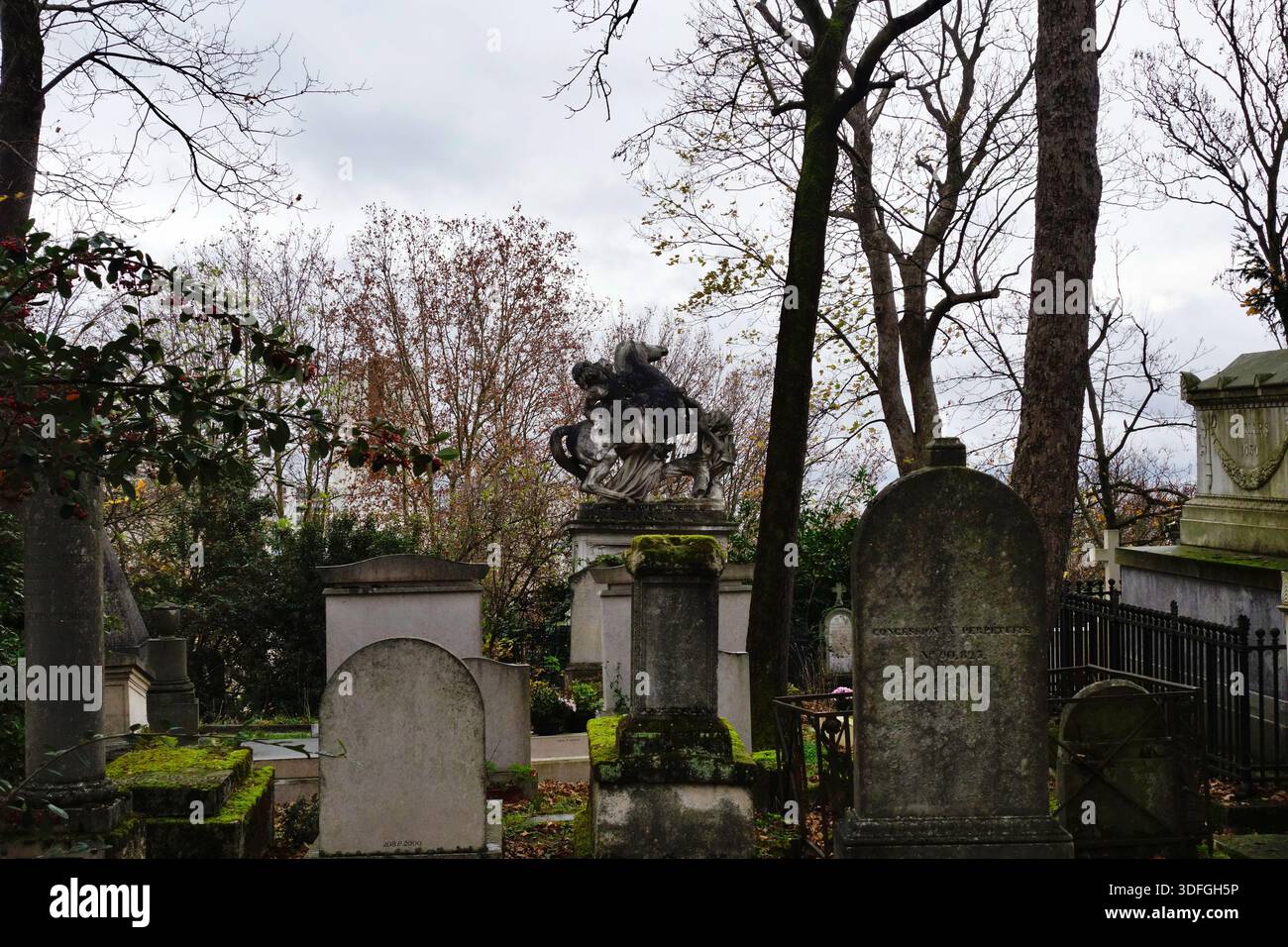 Paris, France. Detail of a tomb inside Père Lachaise Cemetery, the ...