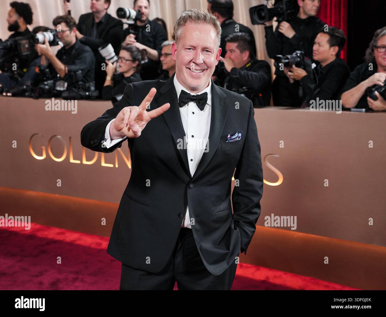 Jared Bush walking on the red carpet at The 83rd Annual Golden Globe ...