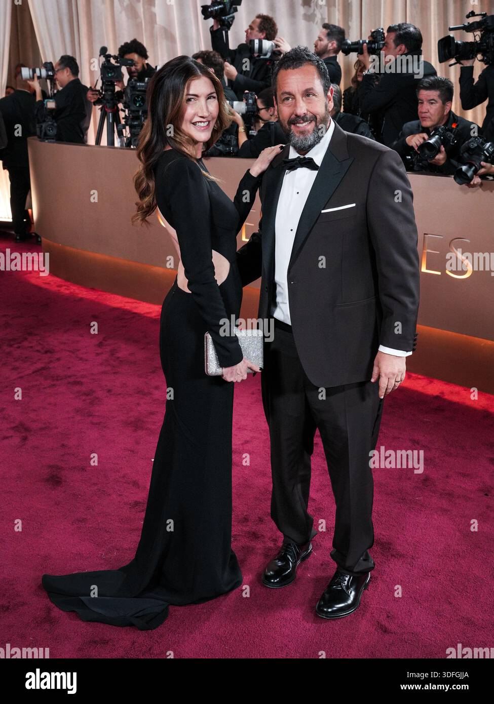 Adam Sandler and Jackie Sandler walking on the red carpet at The 83rd ...