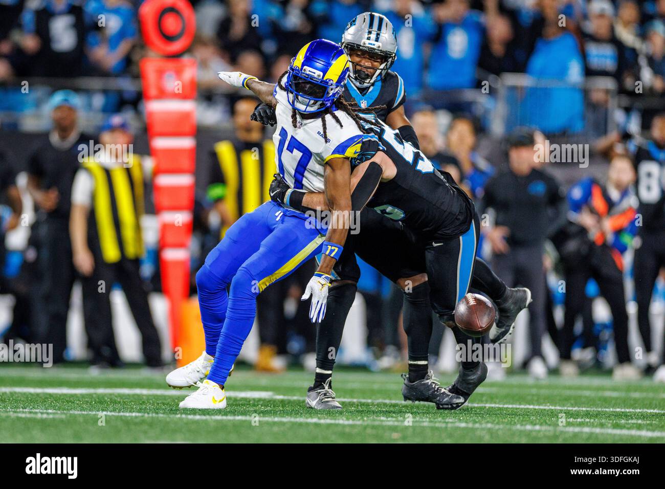 Los Angeles Rams wide receiver Davante Adams, left, has a pass defended ...