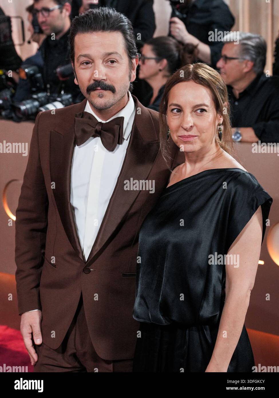 Diego Luna and walking on the red carpet at The 83rd Annual Golden Globe Awards held at The ...