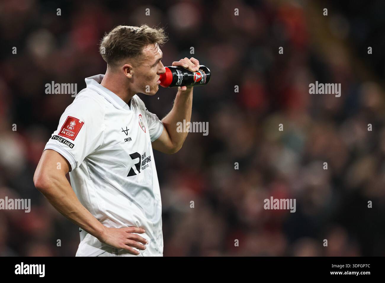 Jack Shepherd of Barnsley takes a drink during a break in the Emirates ...