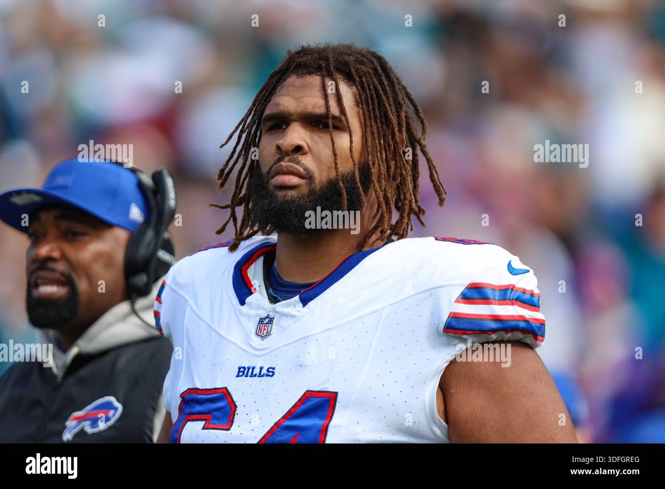Buffalo Bills guard O'Cyrus Torrence (64) walks the sideline before ...