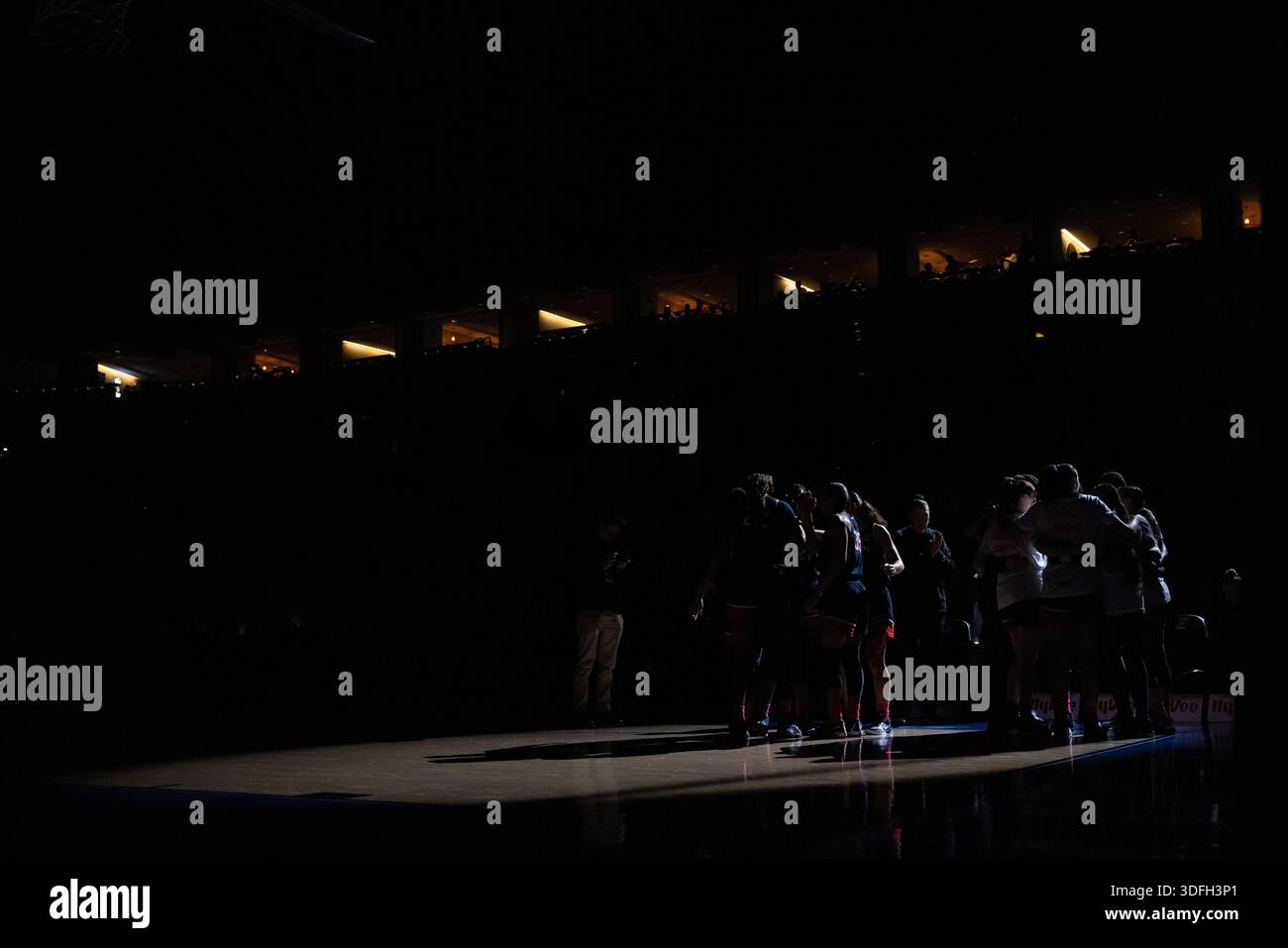 UConn huddles before playing against Creighton in an NCAA college ...