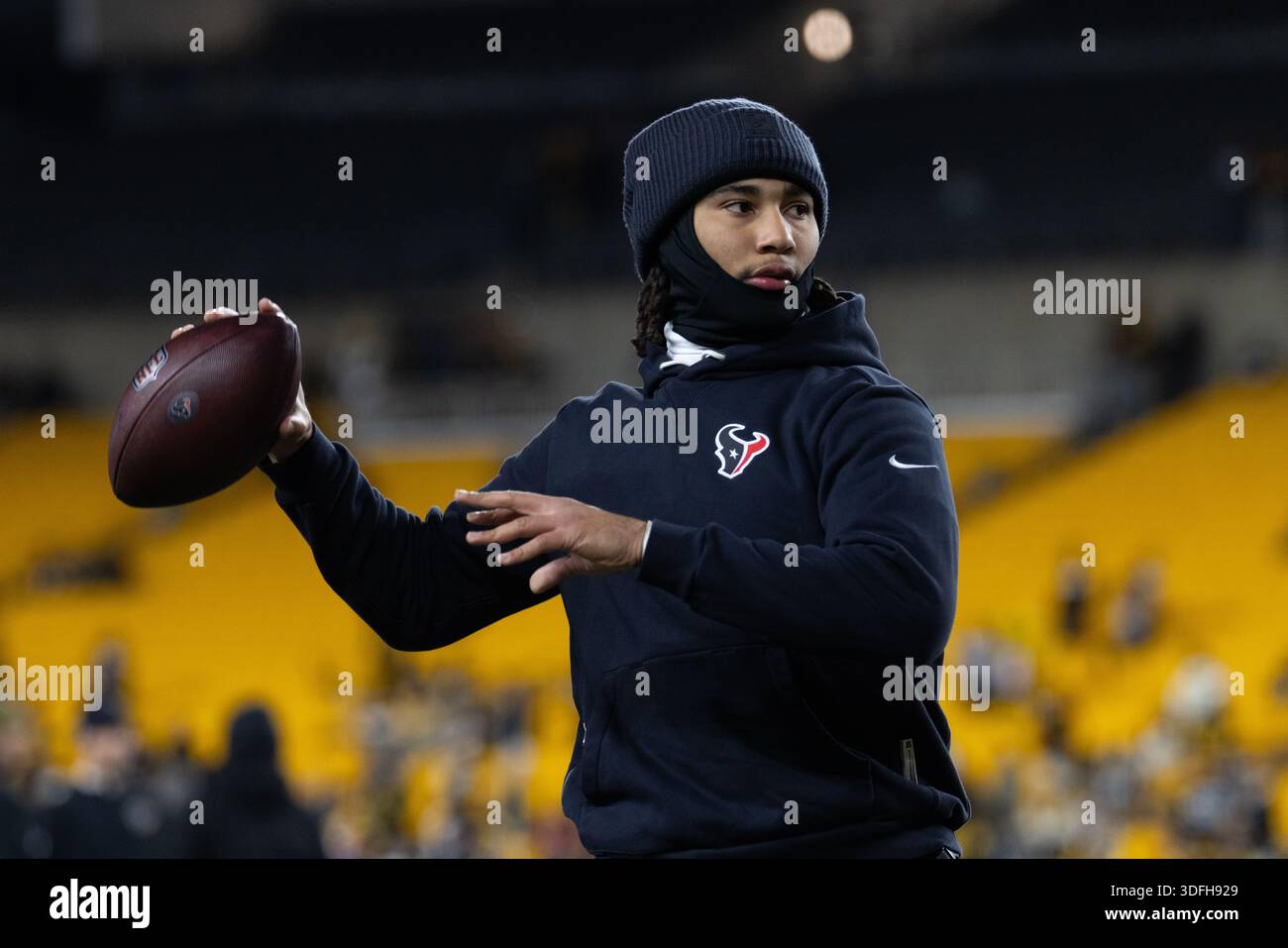 Houston Texans quarterback C.J. Stroud (7) warms up before an NFL wild ...