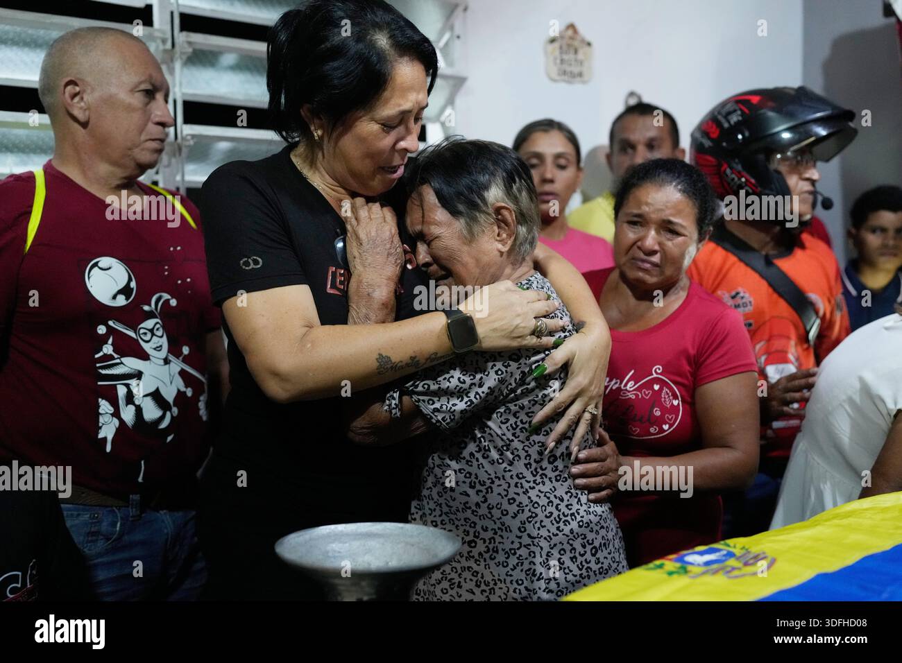 Maria Cristina Fernandez, Edilson Torres' grandmother, and his sister ...