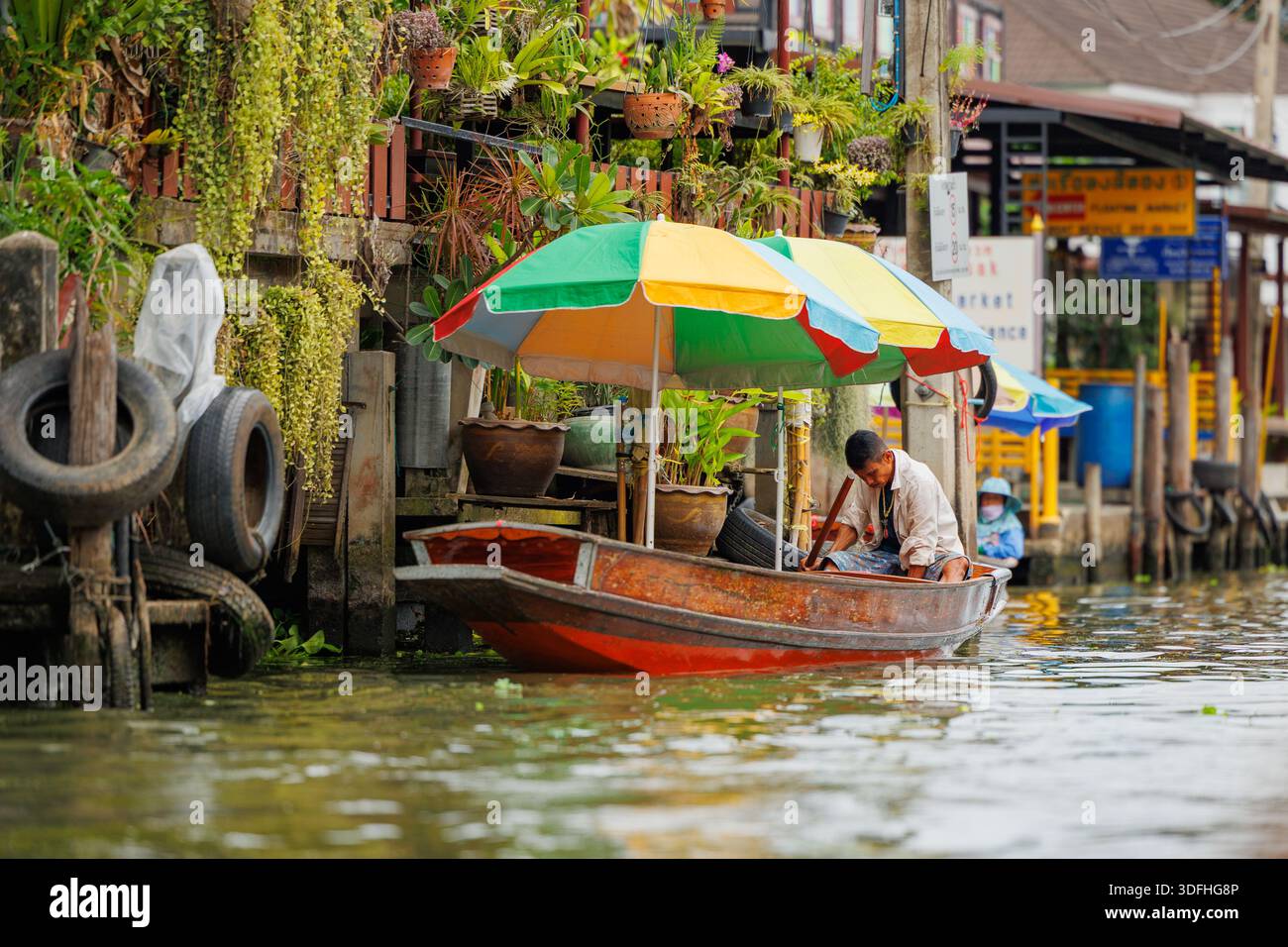 Damnoen Saduak, June 14, 2025. Tourists take boat rides while touring ...