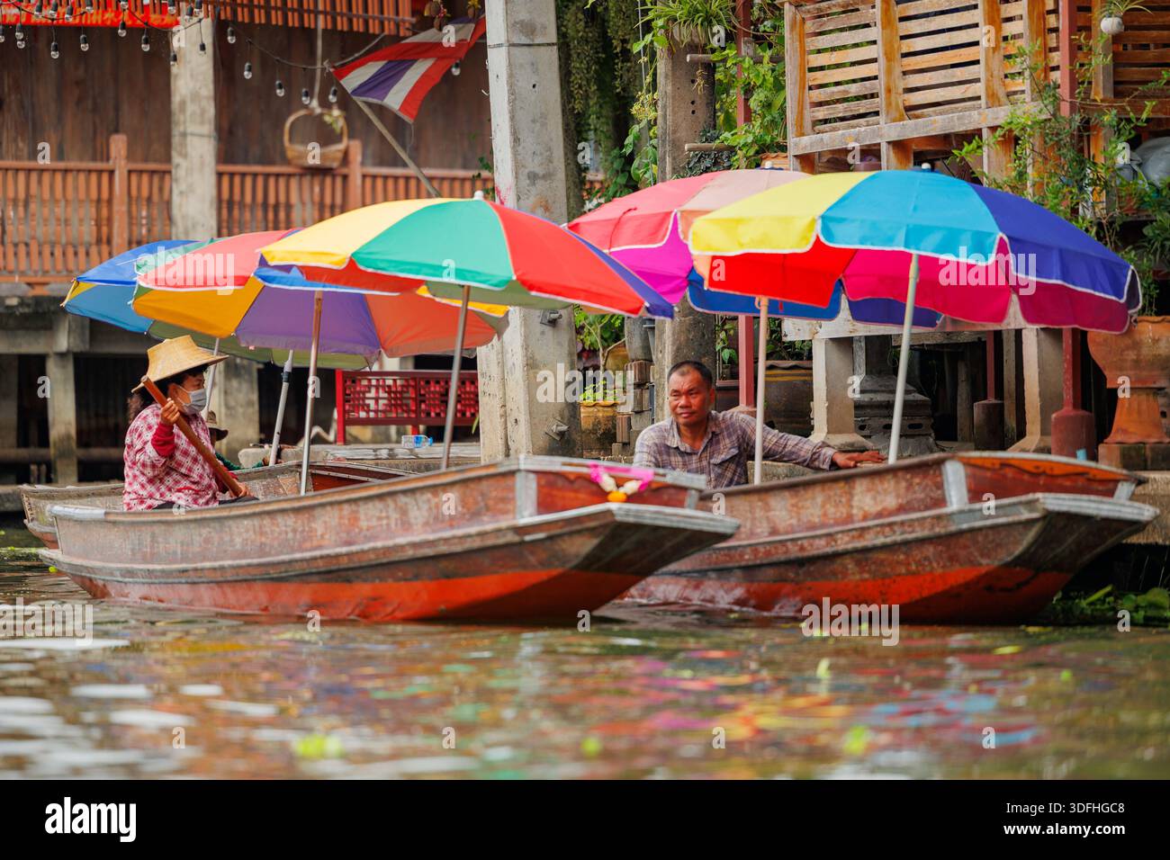 Damnoen Saduak, June 14, 2025. Tourists take boat rides while touring ...