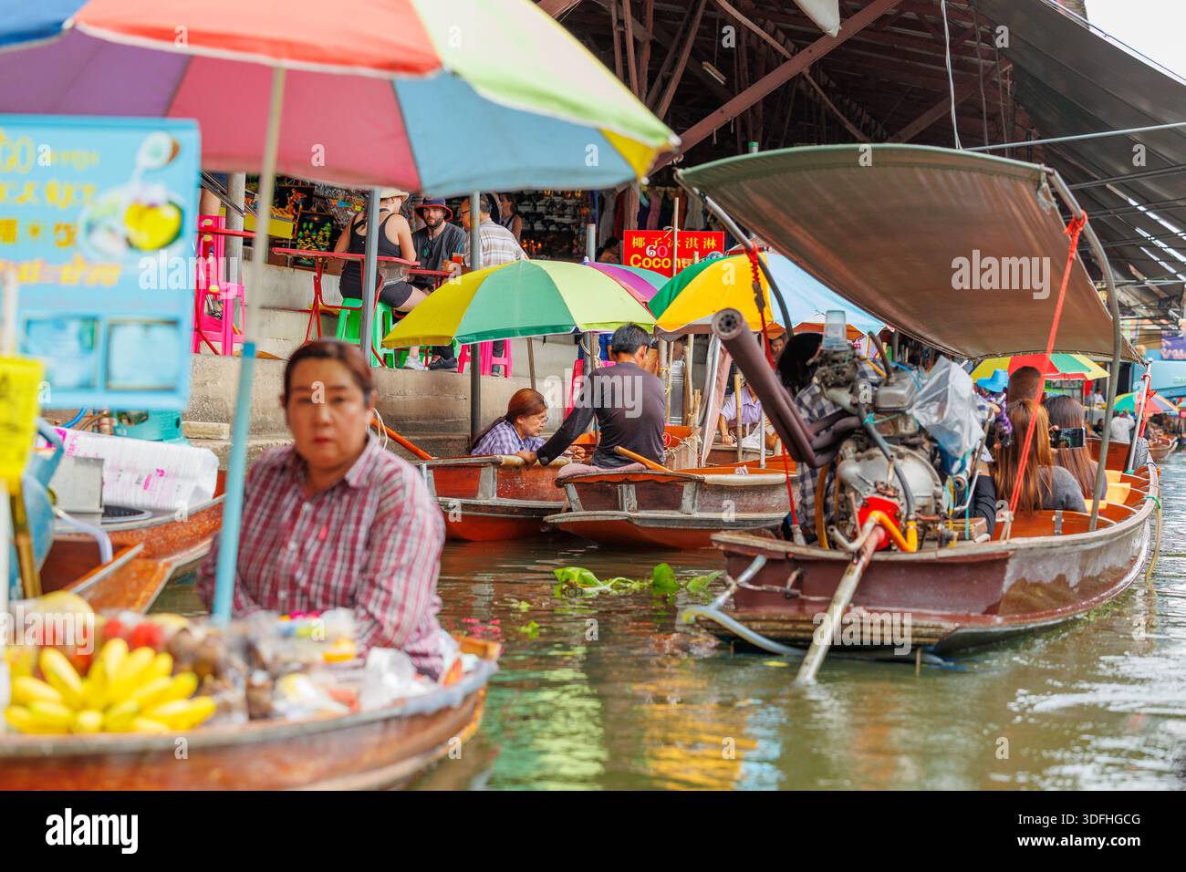 Damnoen Saduak, June 14, 2025. Tourists take boat rides while touring ...