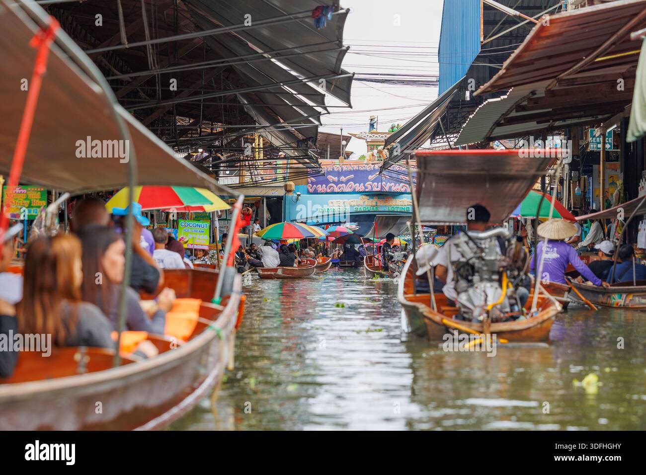 Damnoen Saduak, June 14, 2025. Tourists take boat rides while touring ...