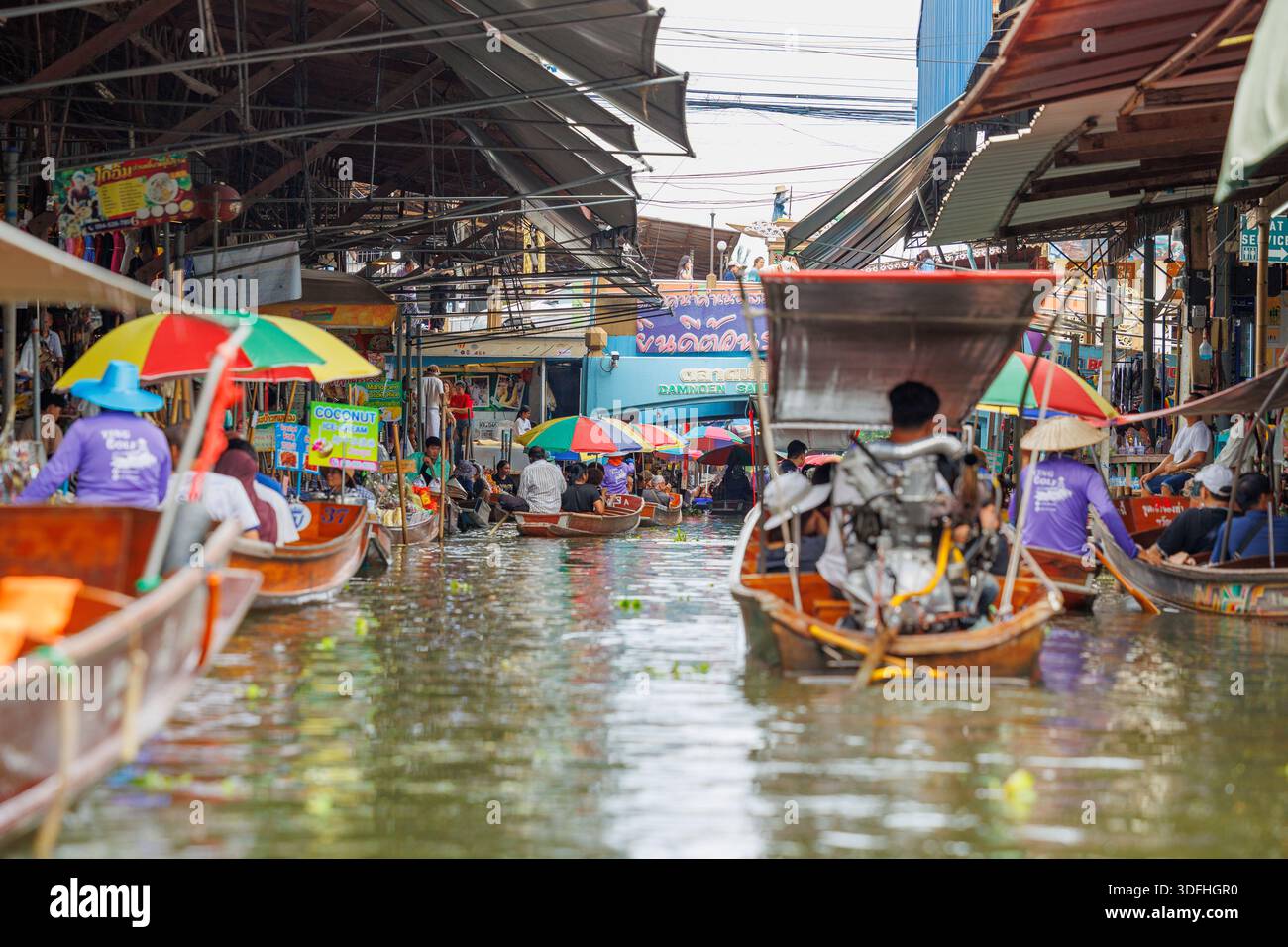 Damnoen Saduak, June 14, 2025. Tourists take boat rides while touring ...