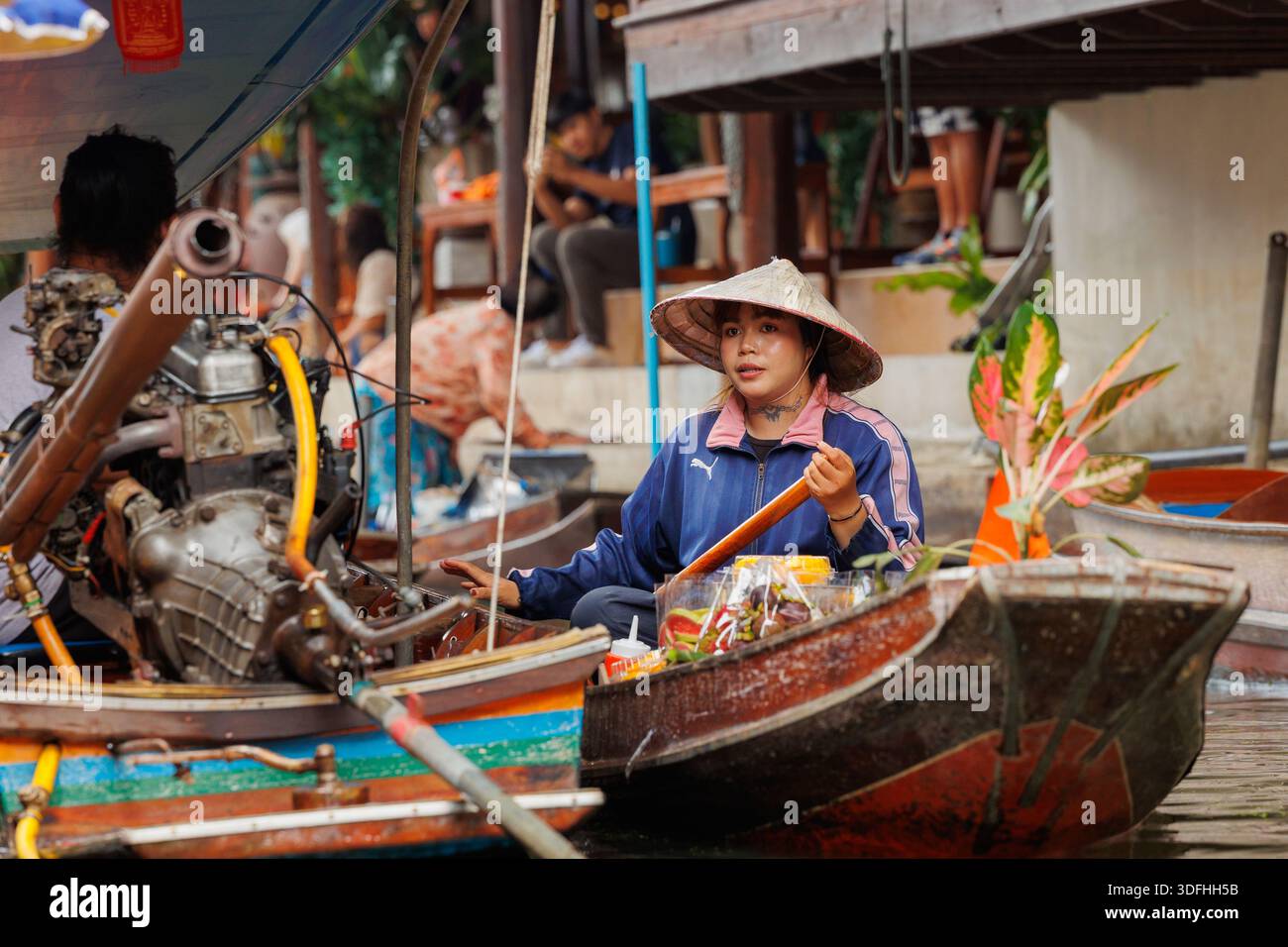 Damnoen Saduak, June 14, 2025. Tourists take boat rides while touring ...