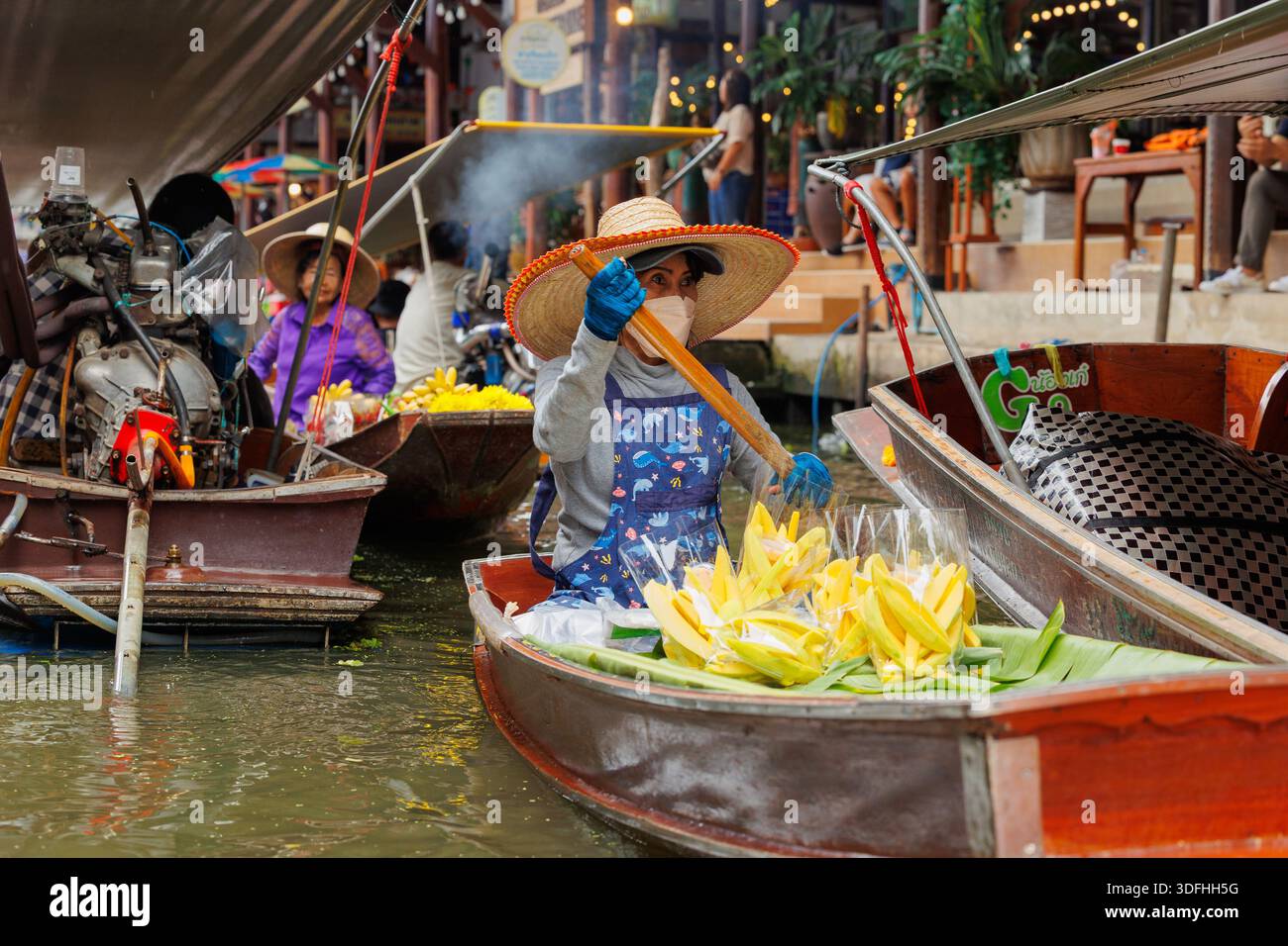 Damnoen Saduak, June 14, 2025. Tourists take boat rides while touring ...