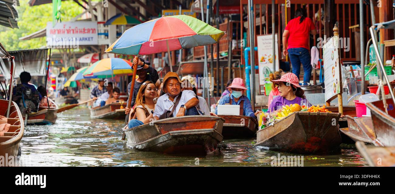 Damnoen Saduak, June 14, 2025. Tourists take boat rides while touring ...