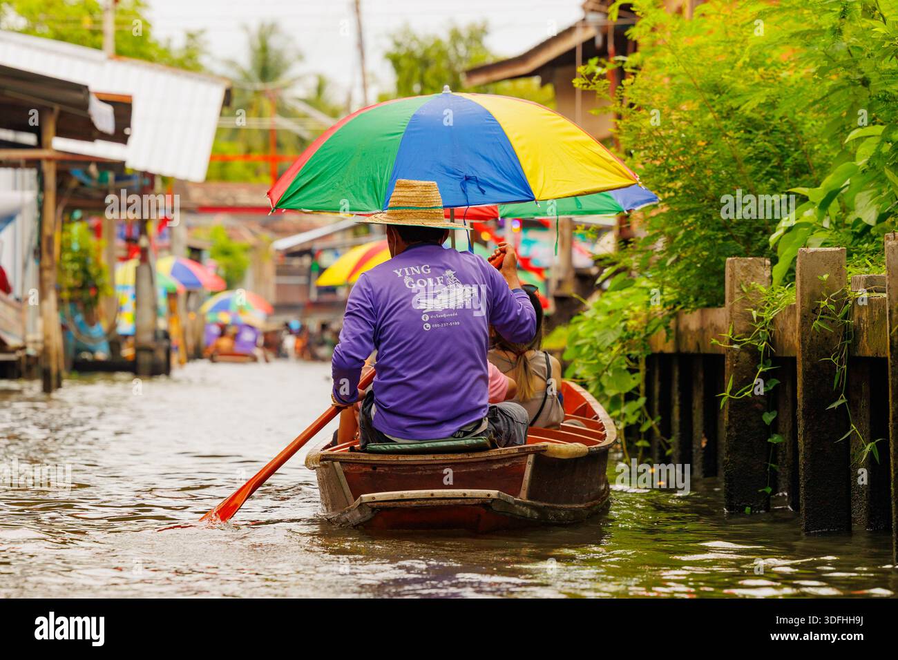Damnoen Saduak, June 14, 2025. Tourists take boat rides while touring ...
