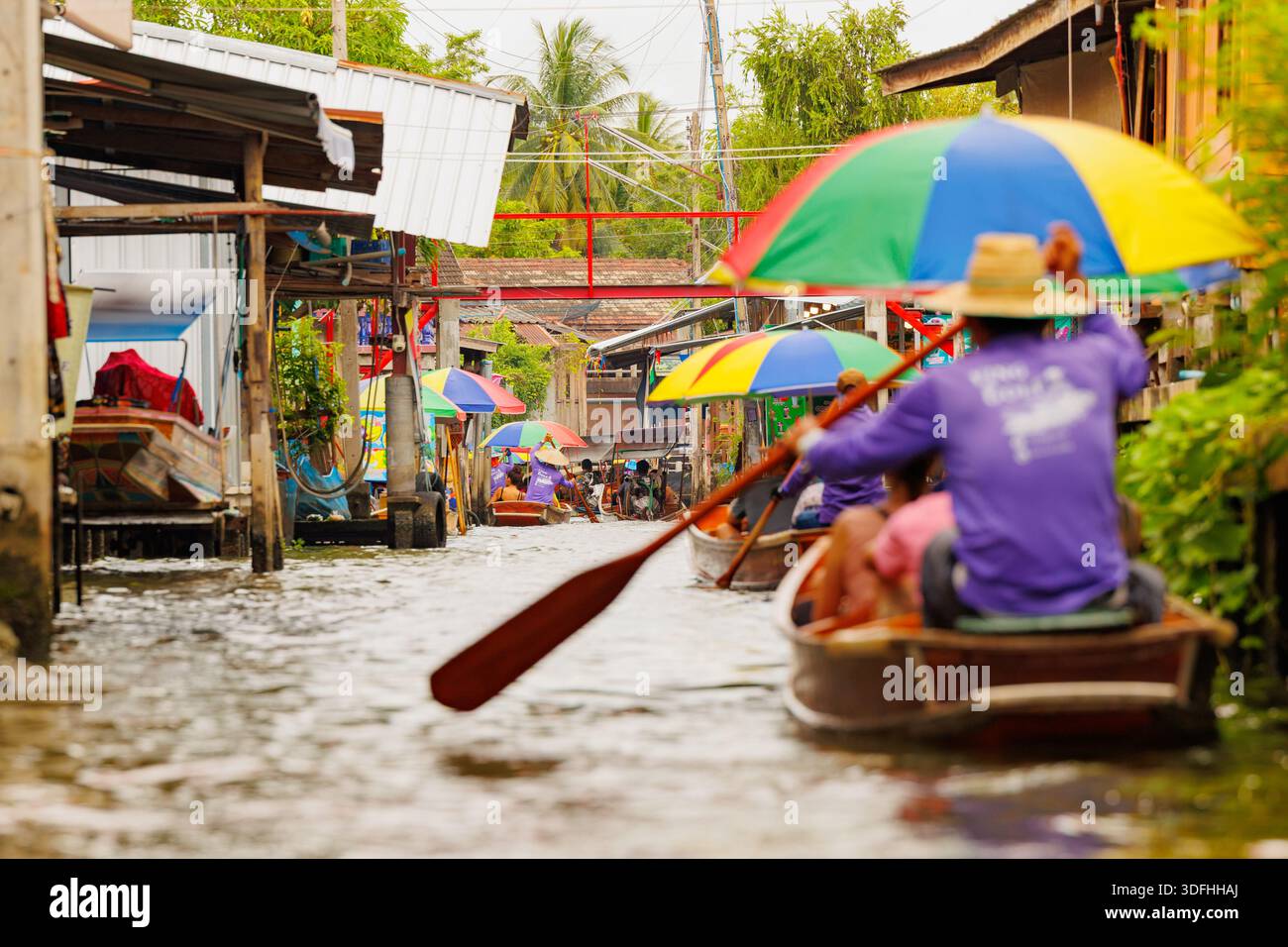 Damnoen Saduak, June 14, 2025. Tourists take boat rides while touring ...