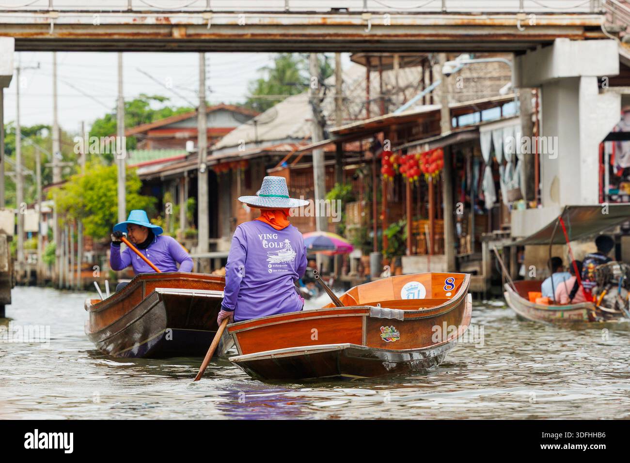 Damnoen Saduak, June 14, 2025. Tourists take boat rides while touring ...