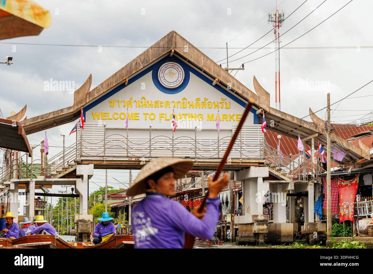 Damnoen Saduak, June 14, 2025. Welcome to Floating Market sign is ...