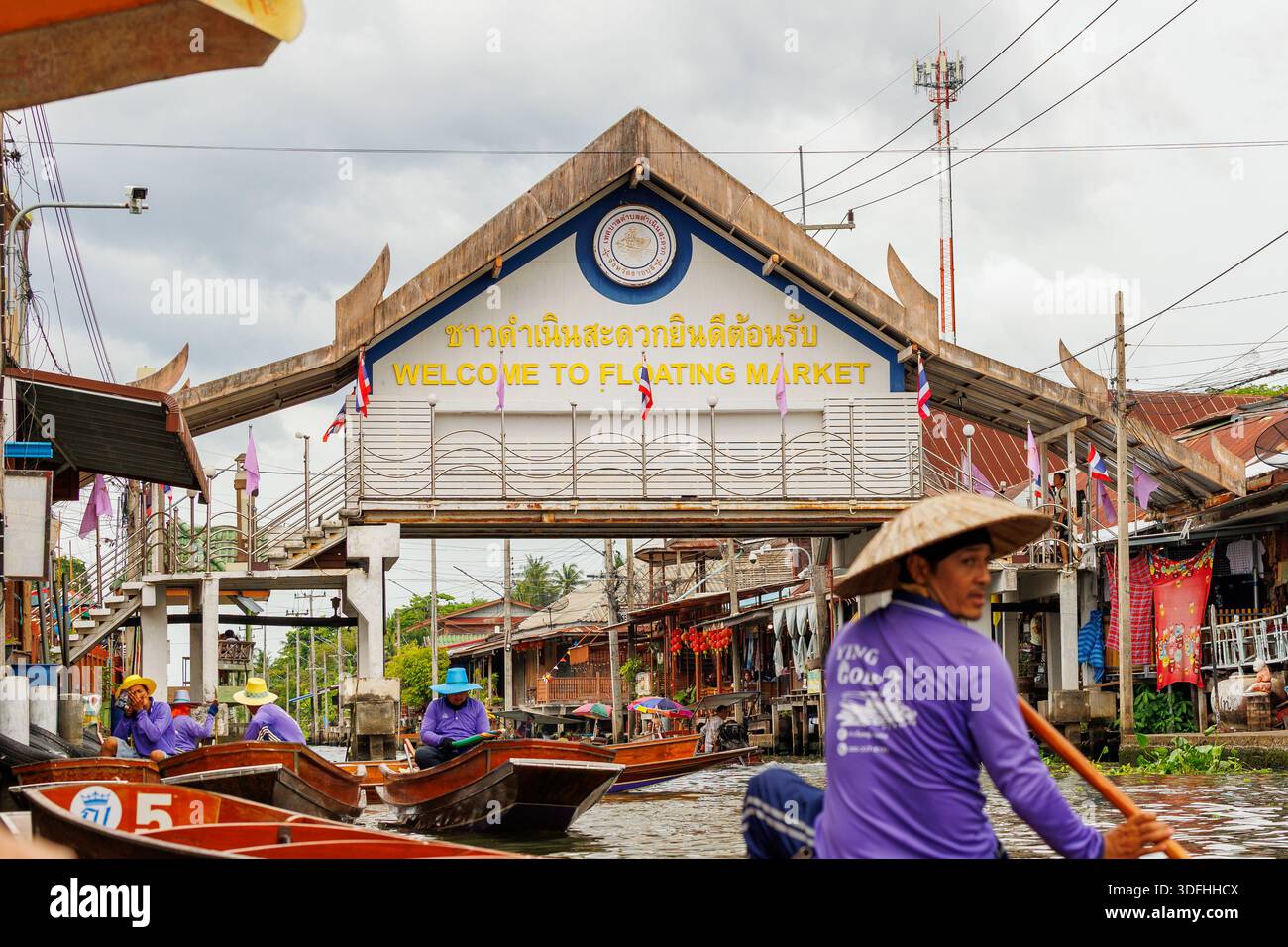 Damnoen Saduak, June 14, 2025. Welcome to Floating Market sign is ...