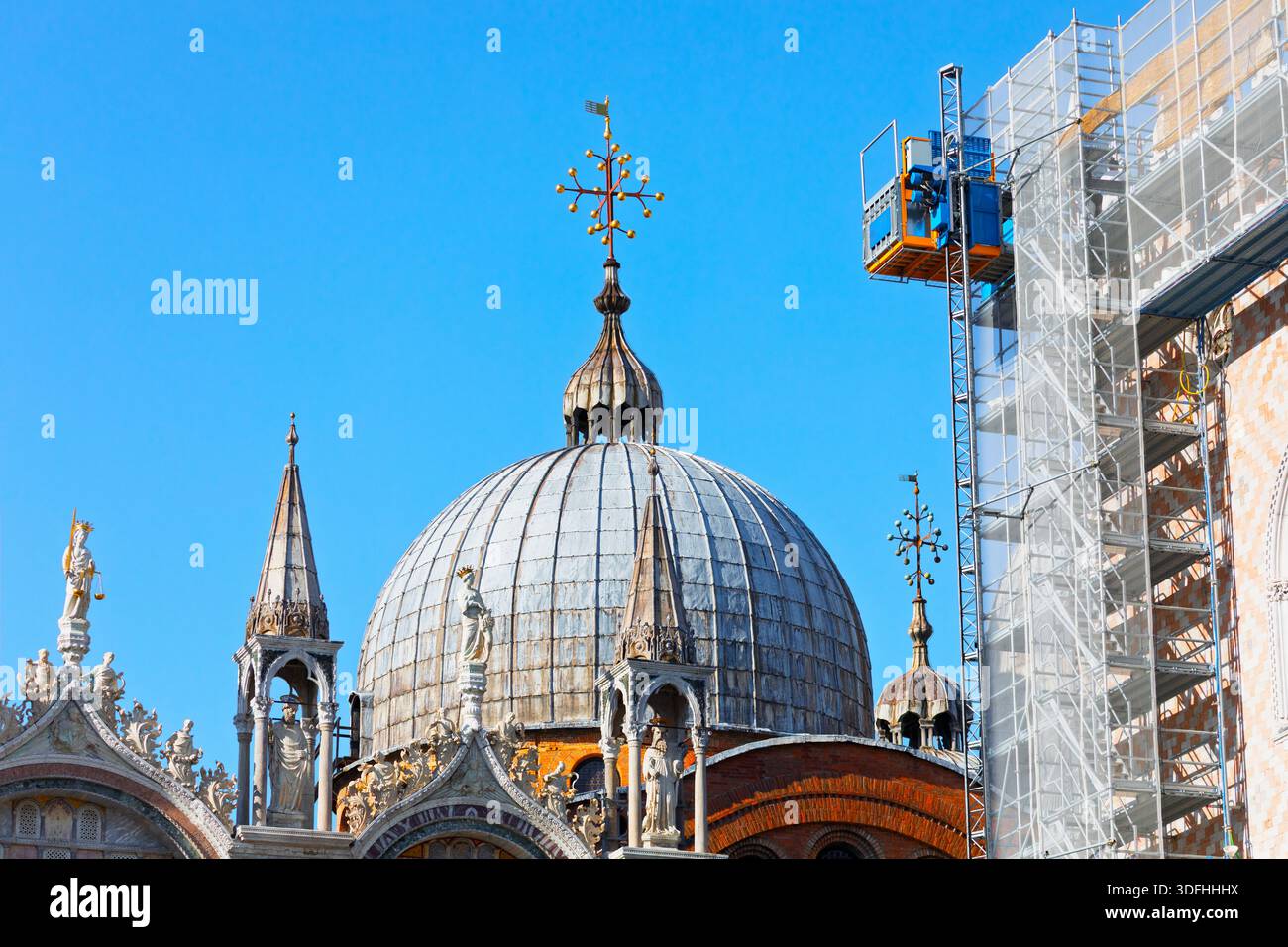 St Mark Basilica in Venice with its iconic domes and ornate details ...