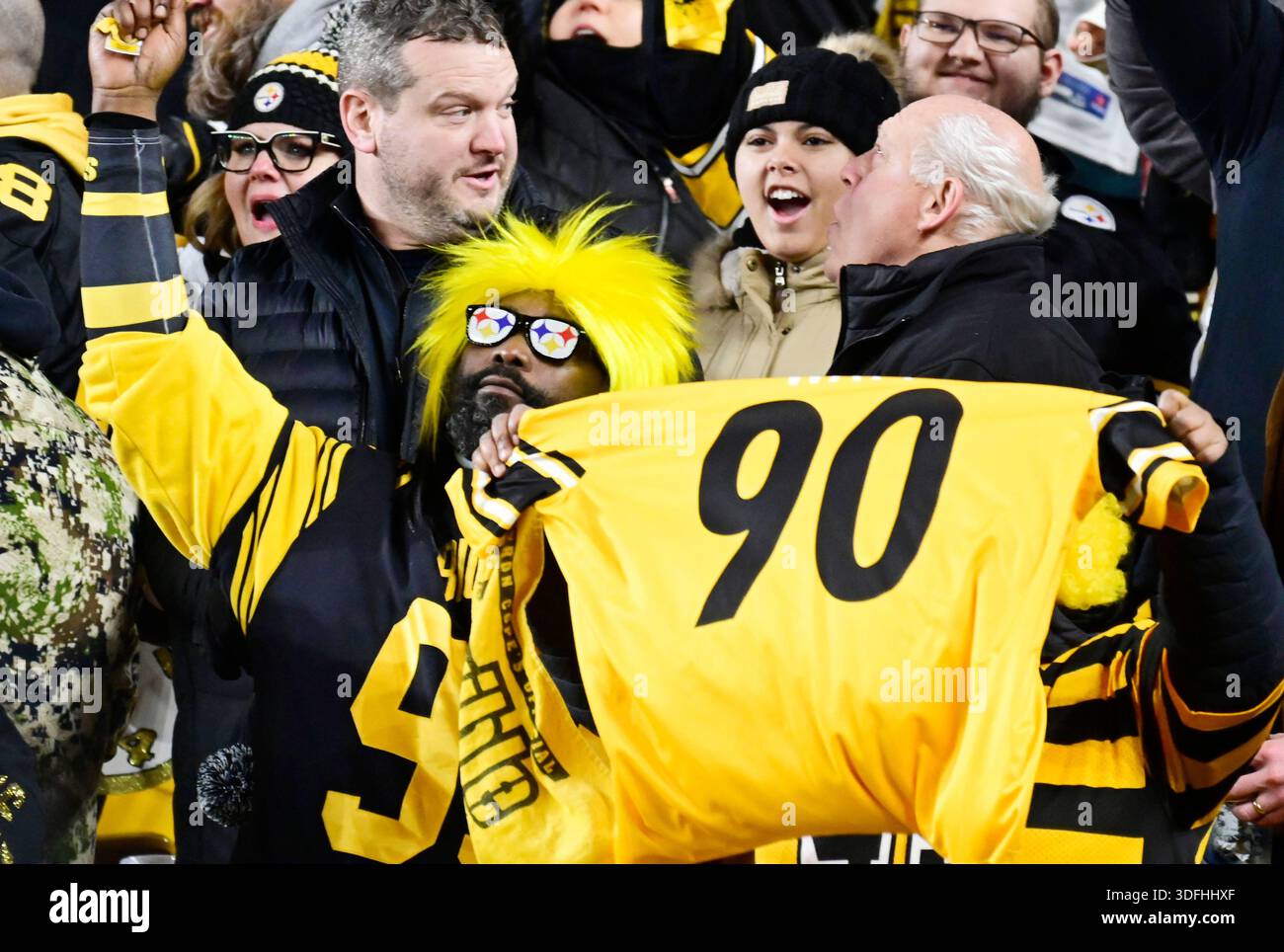 Pittsburgh fans root for their team in the first quarter of an NFL wild ...