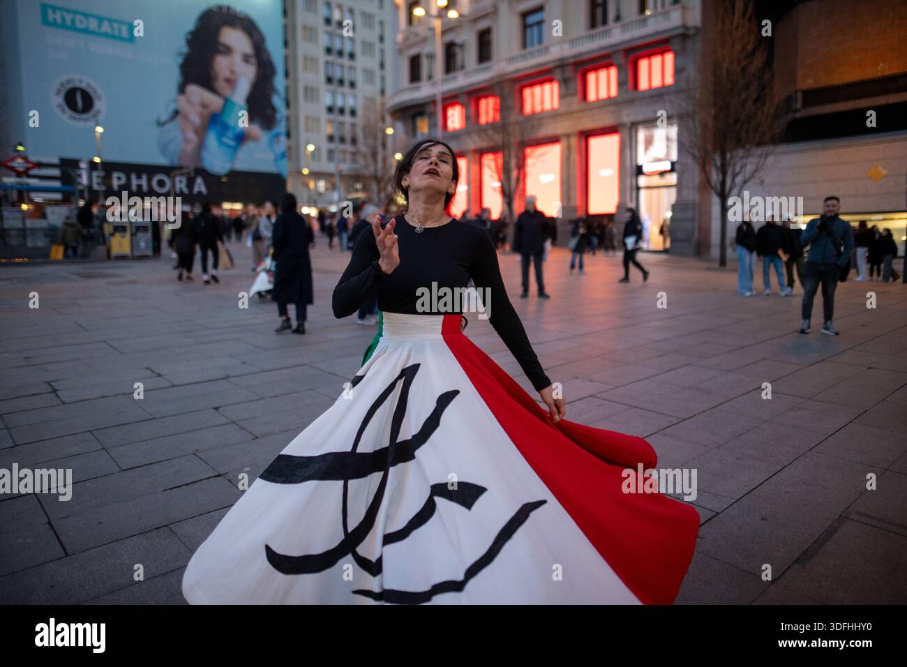 A young woman of Iranian origin dances the traditional "Simurgh Dance ...