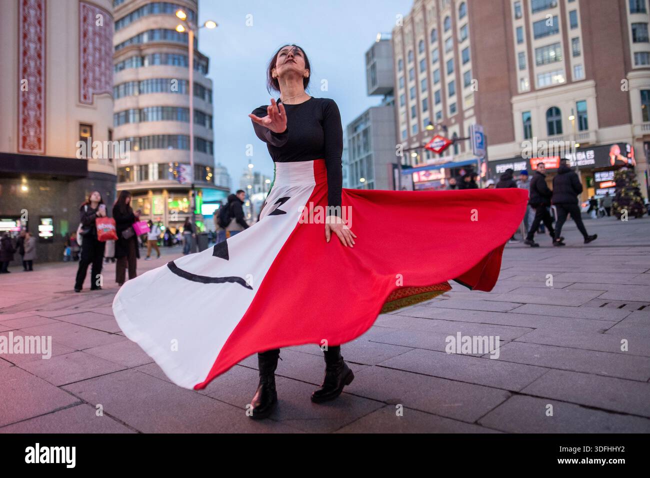 A young woman of Iranian origin dances the traditional "Simurgh Dance ...