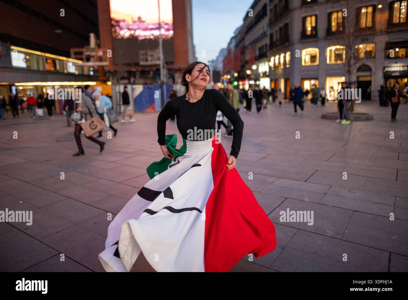 A young woman of Iranian origin dances the traditional "Simurgh Dance ...