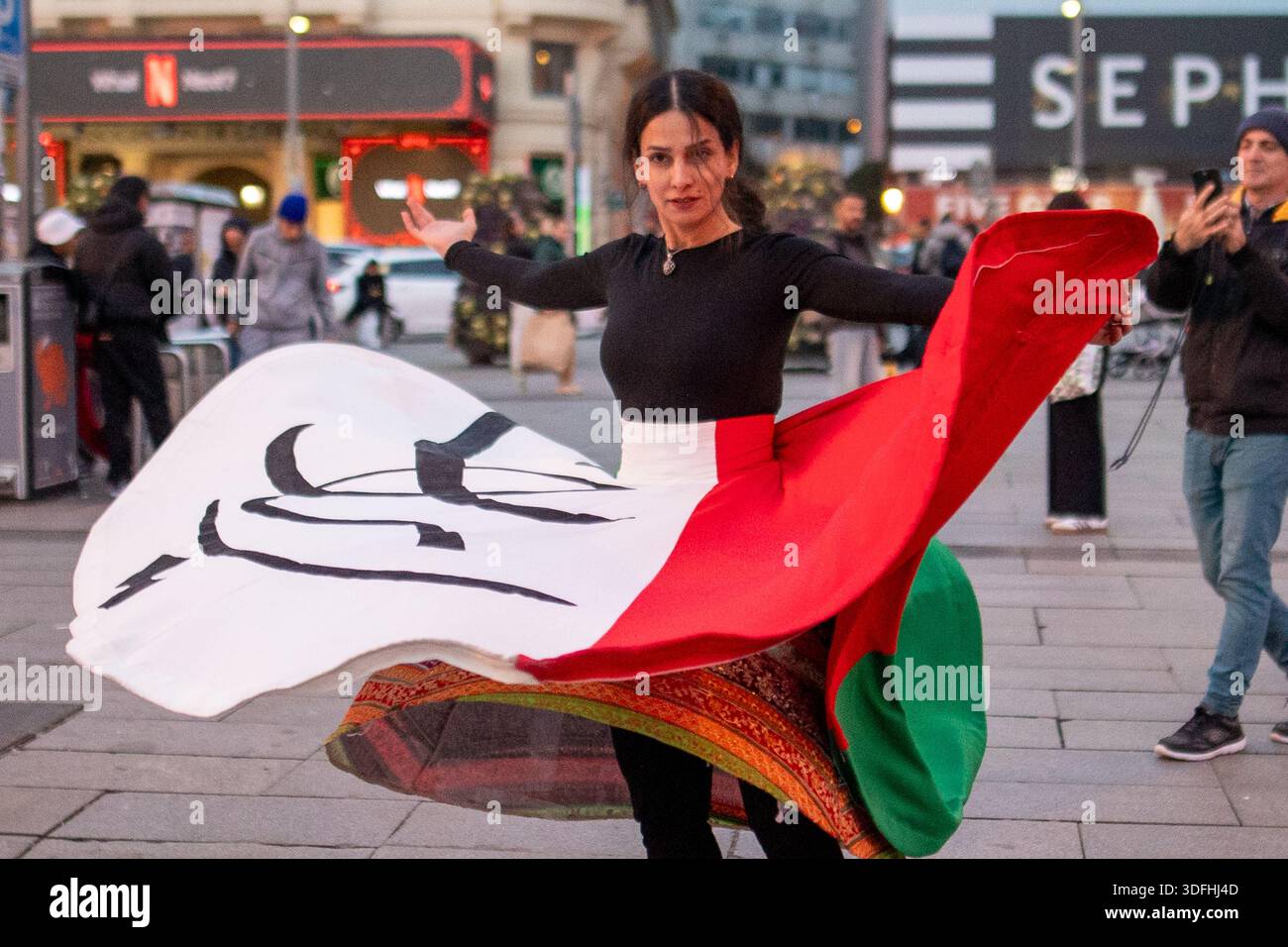 A young woman of Iranian origin dances the traditional "Simurgh Dance ...