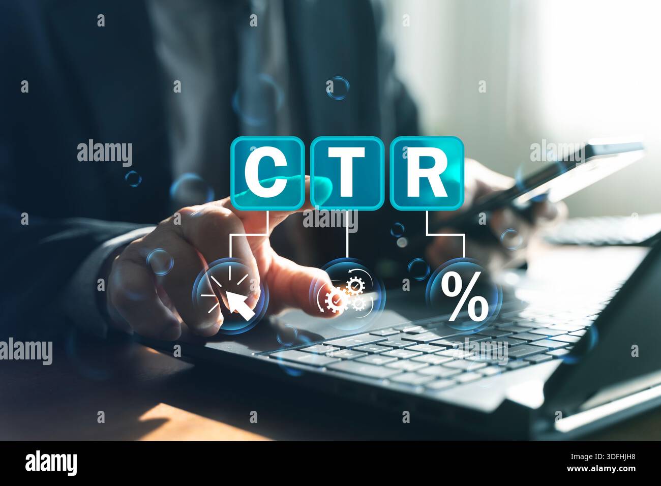 Businessman using laptop and tablet with CTR interface and KPI icons ...