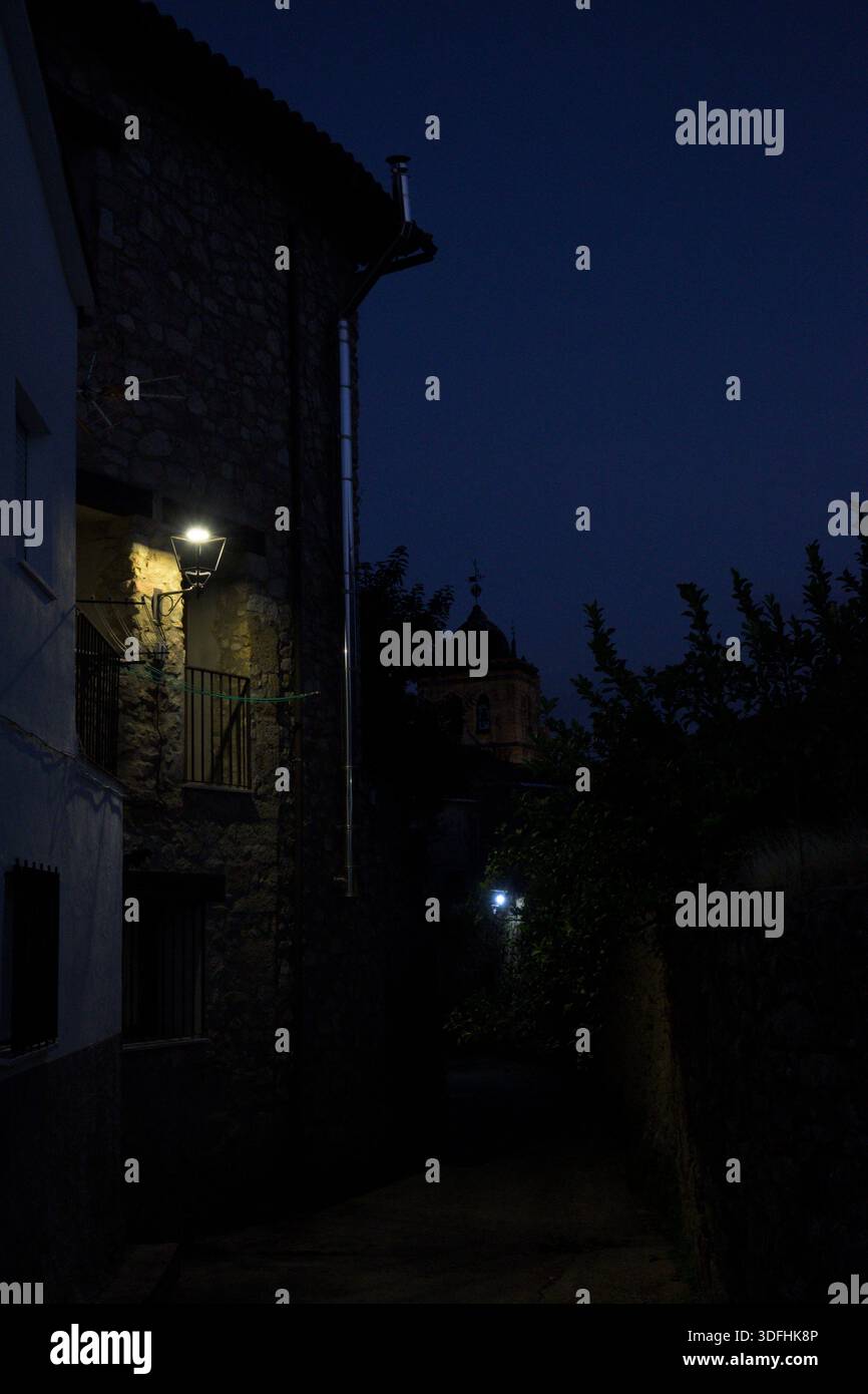 Night view of small stone village street in Acebo Spain illuminated by ...