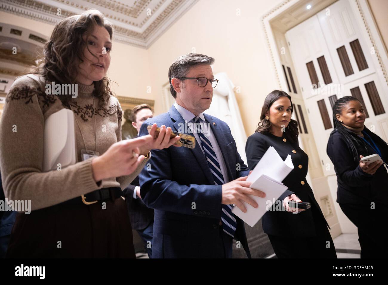 House Speaker Mike Johnson (R-La.) speaks with reporters as he departs ...