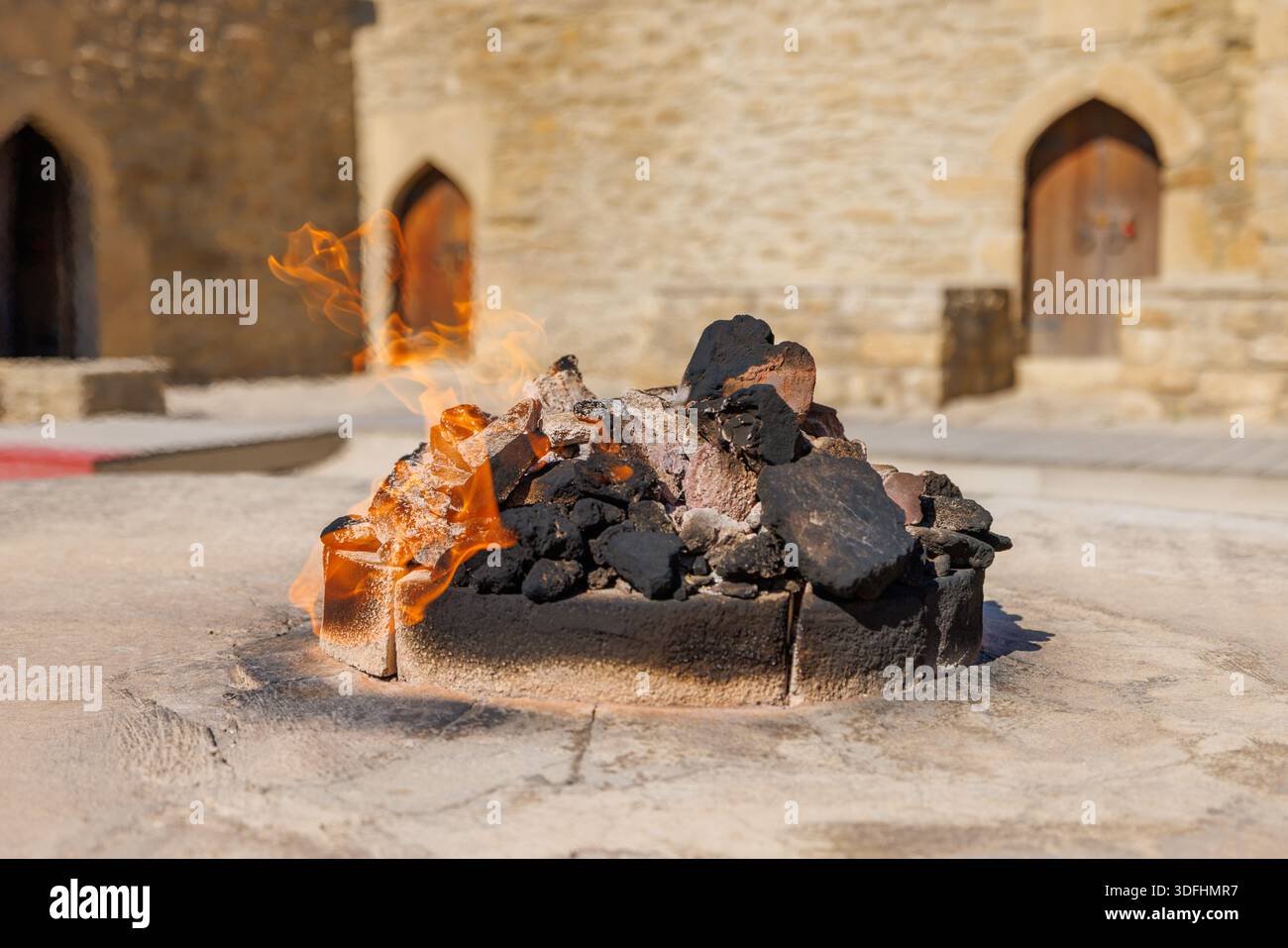 Close up view of a gas fire pit at the Atashgah Zoroastrian Fire Temple ...