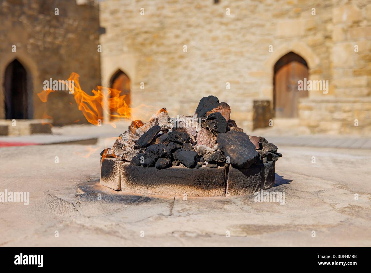 Close up view of a gas fire pit at the Atashgah Zoroastrian Fire Temple ...