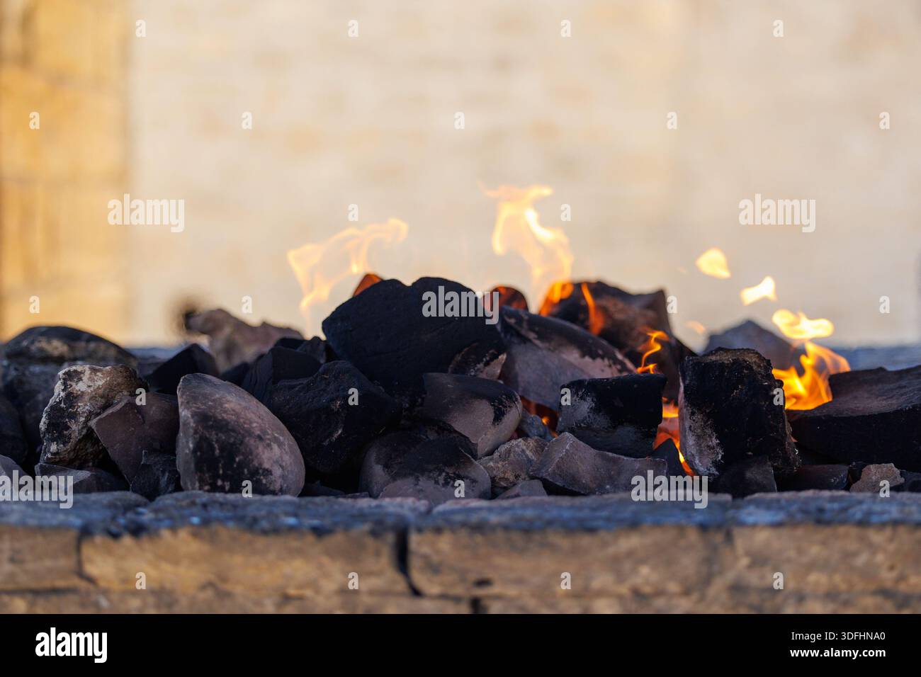 Close up view of a gas fire pit at the Atashgah Zoroastrian Fire Temple ...