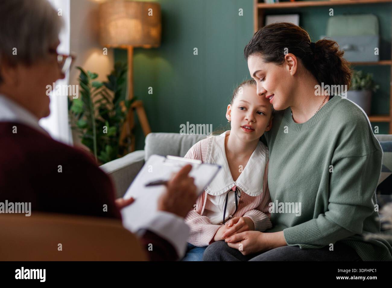 Consultation of child and mother on reception for psychologist Stock ...