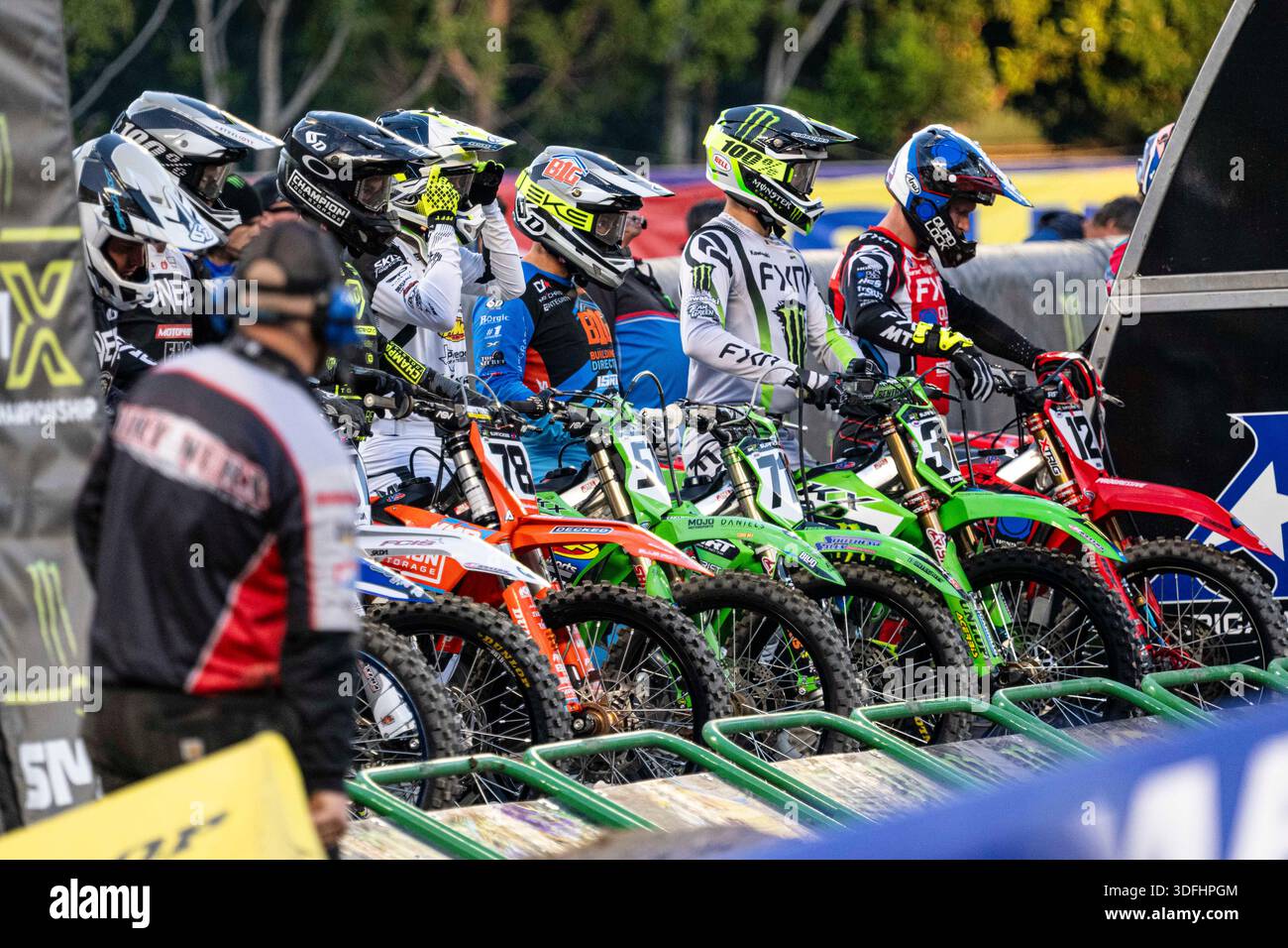 Riders of the 450 class stage at the starting line before the main ...